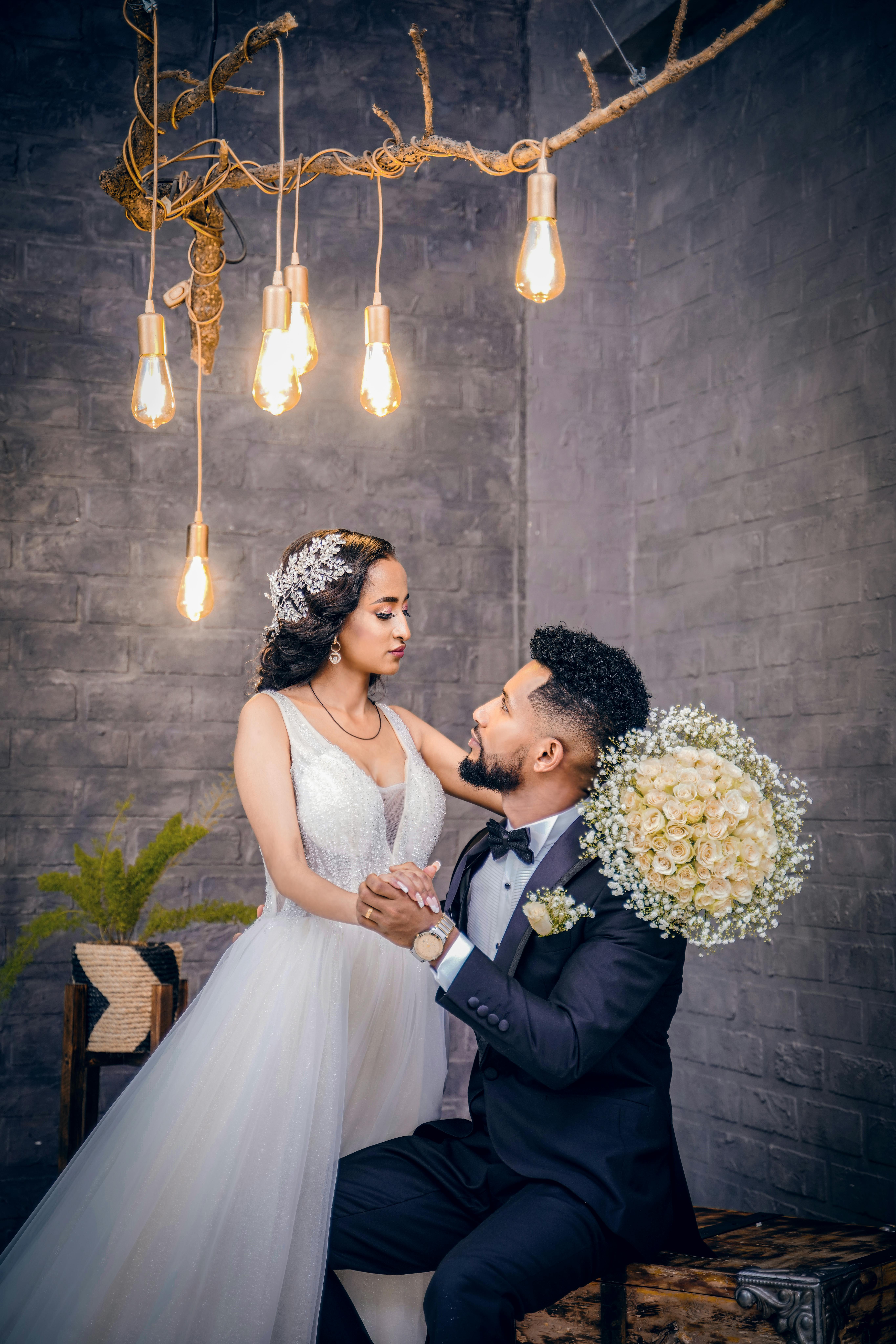 Elegant Bridal Couple in Indoor Wedding Setting · Free Stock Photo