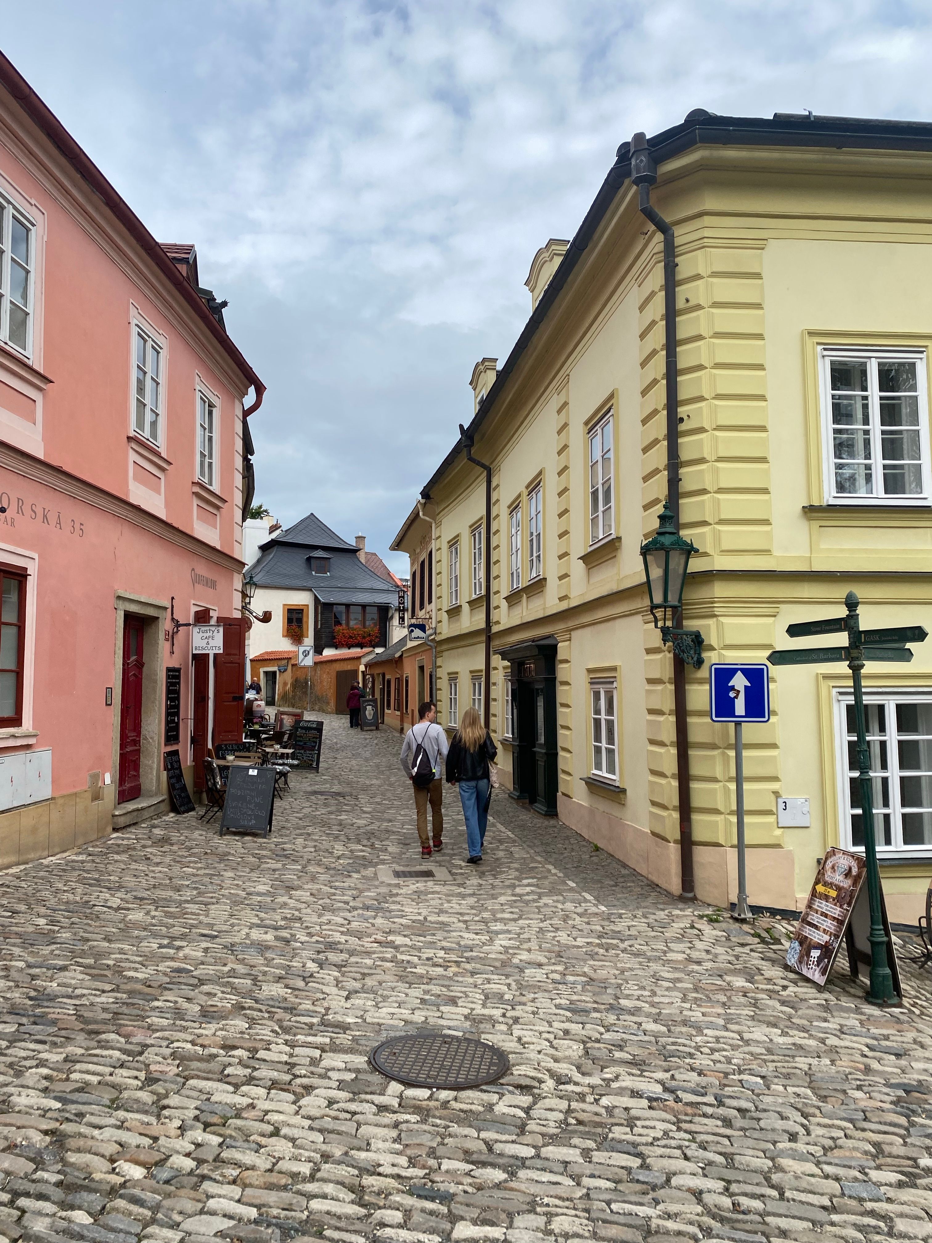 Charming European Cobbled Street with Colorful Buildings · Free Stock Photo