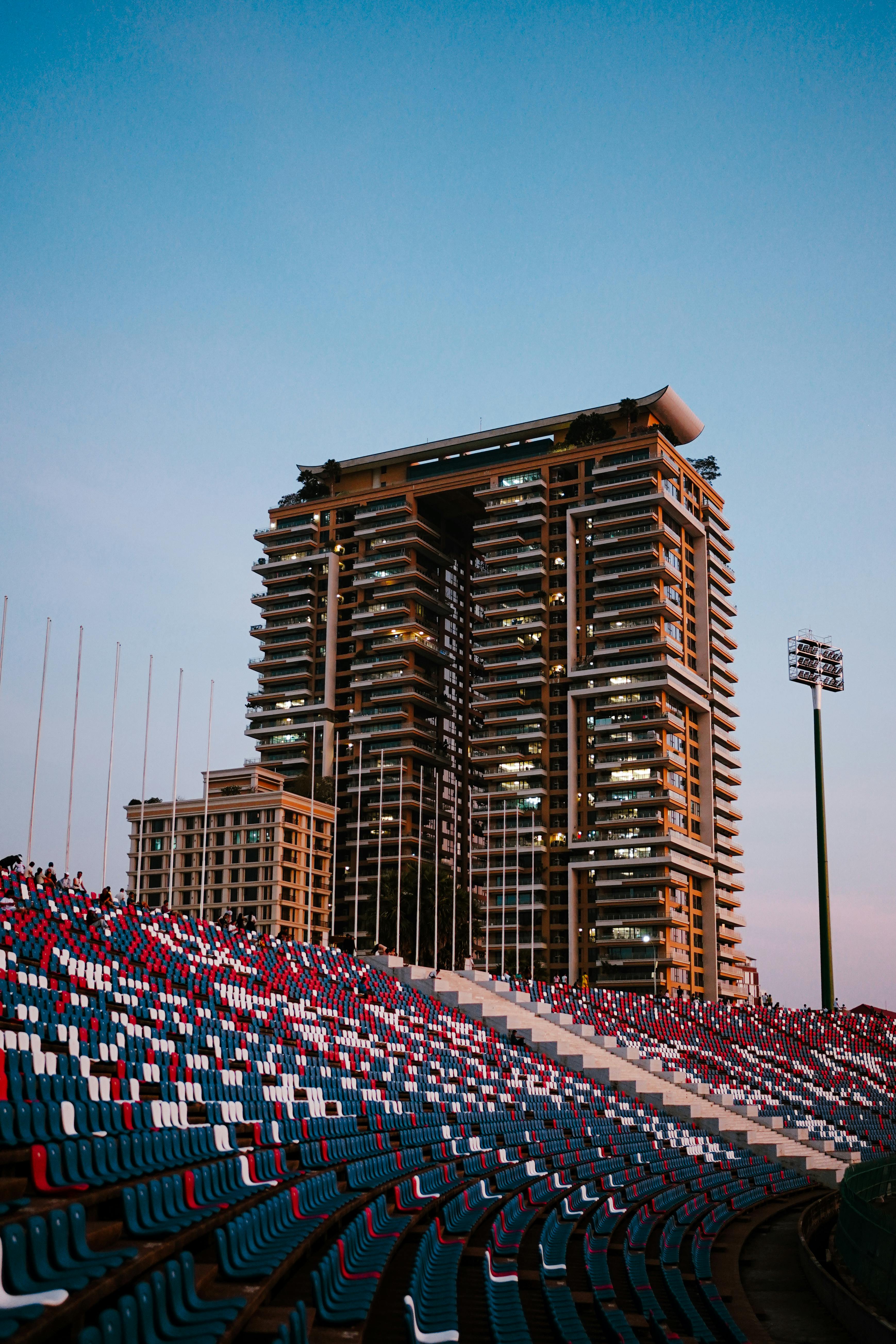 Modern High-Rise Overlooking Phnom Penh Stadium · Free Stock Photo
