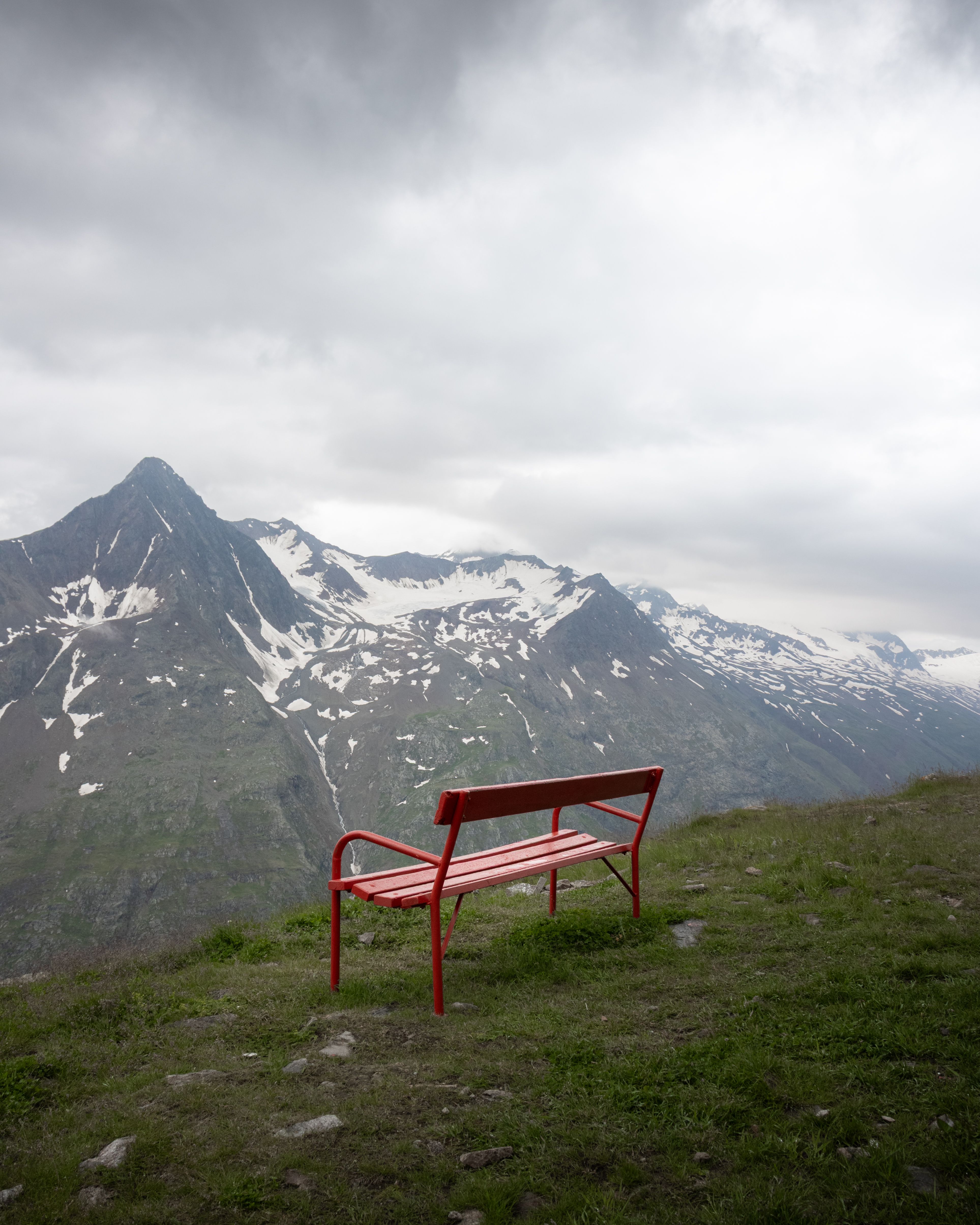 Red Bench Overlooking Austrian Alps in Tirol · Free Stock Photo