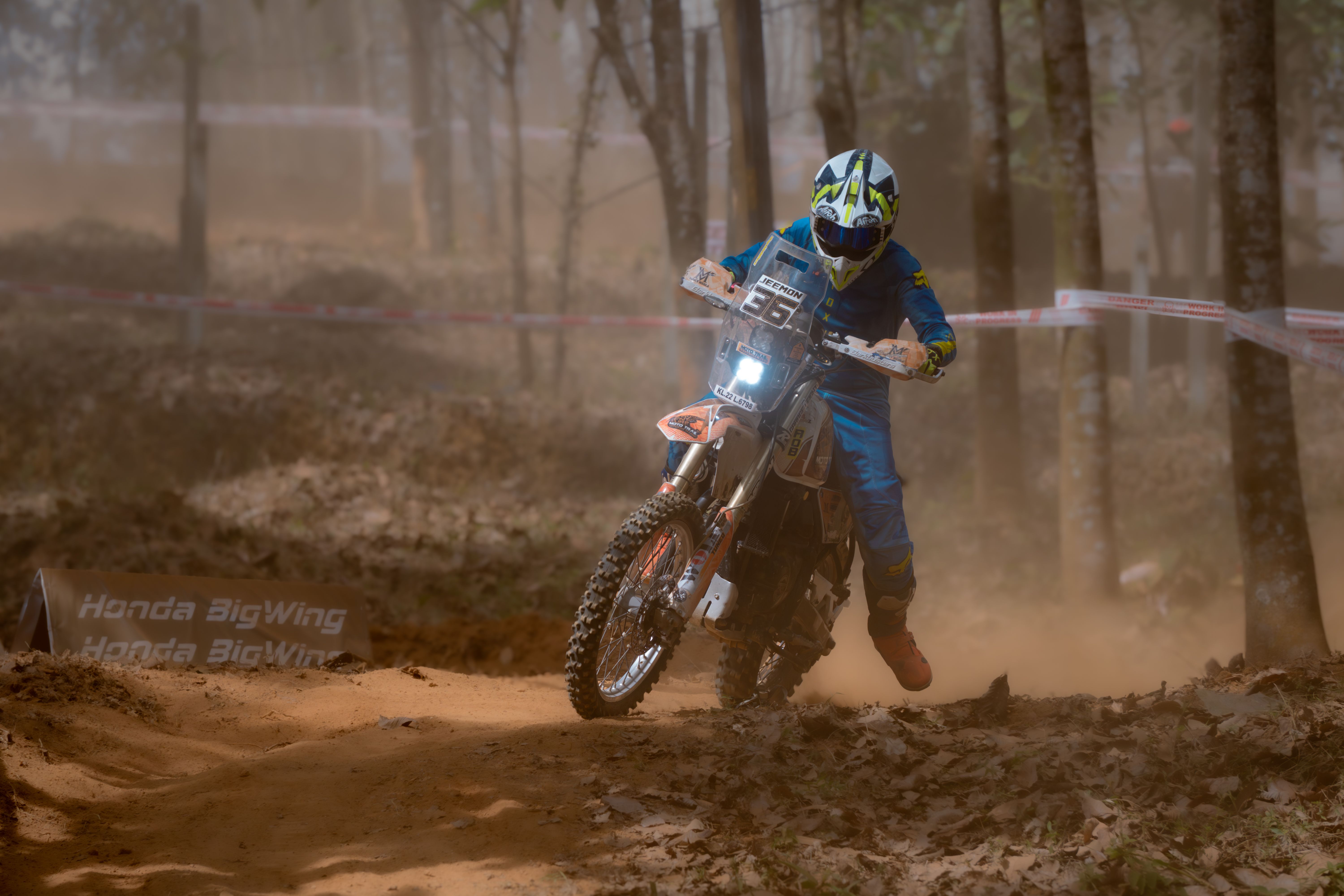 Dirt Bike Racer Navigating Off-Road Trail · Free Stock Photo