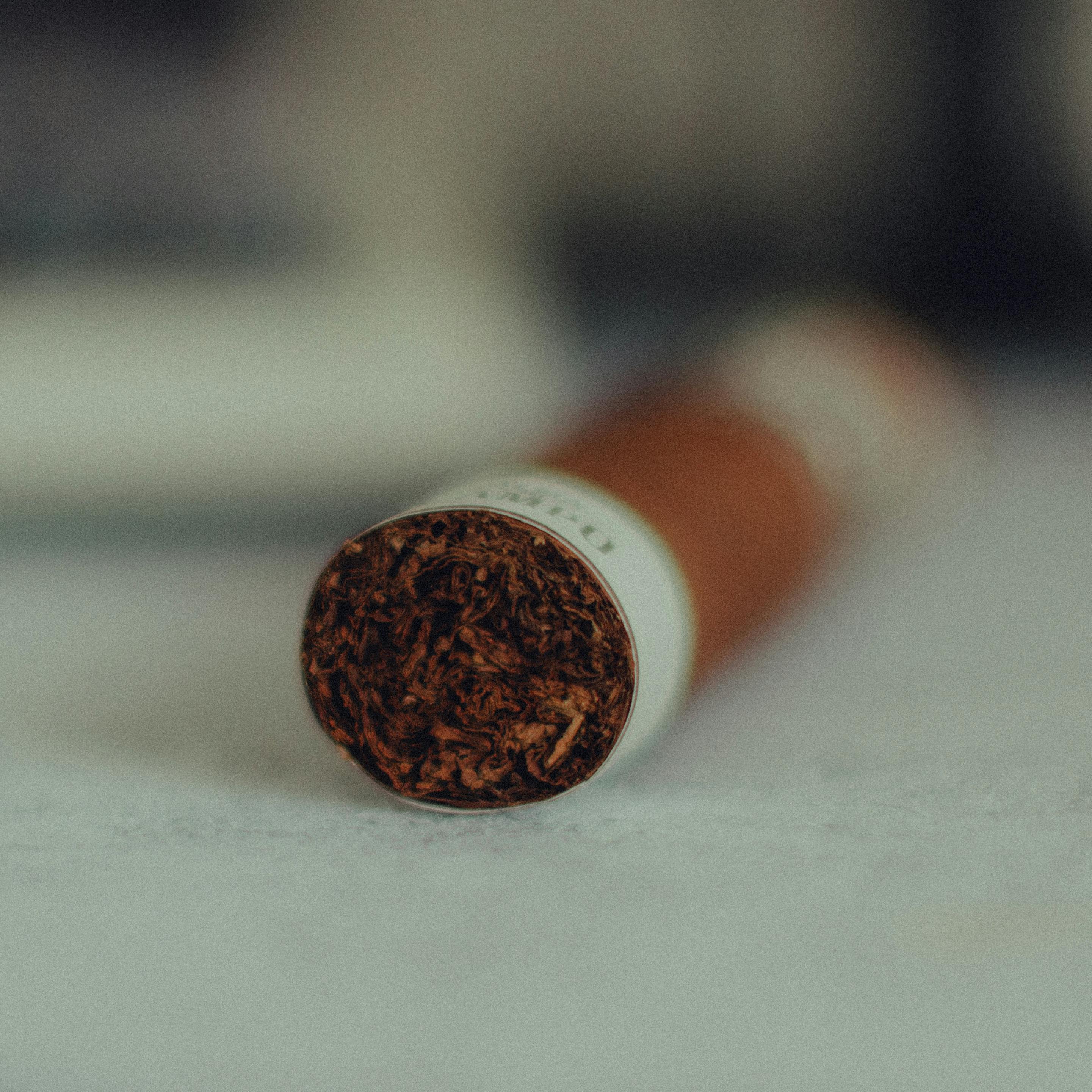 Close-up View of a Cigar on a Table · Free Stock Photo