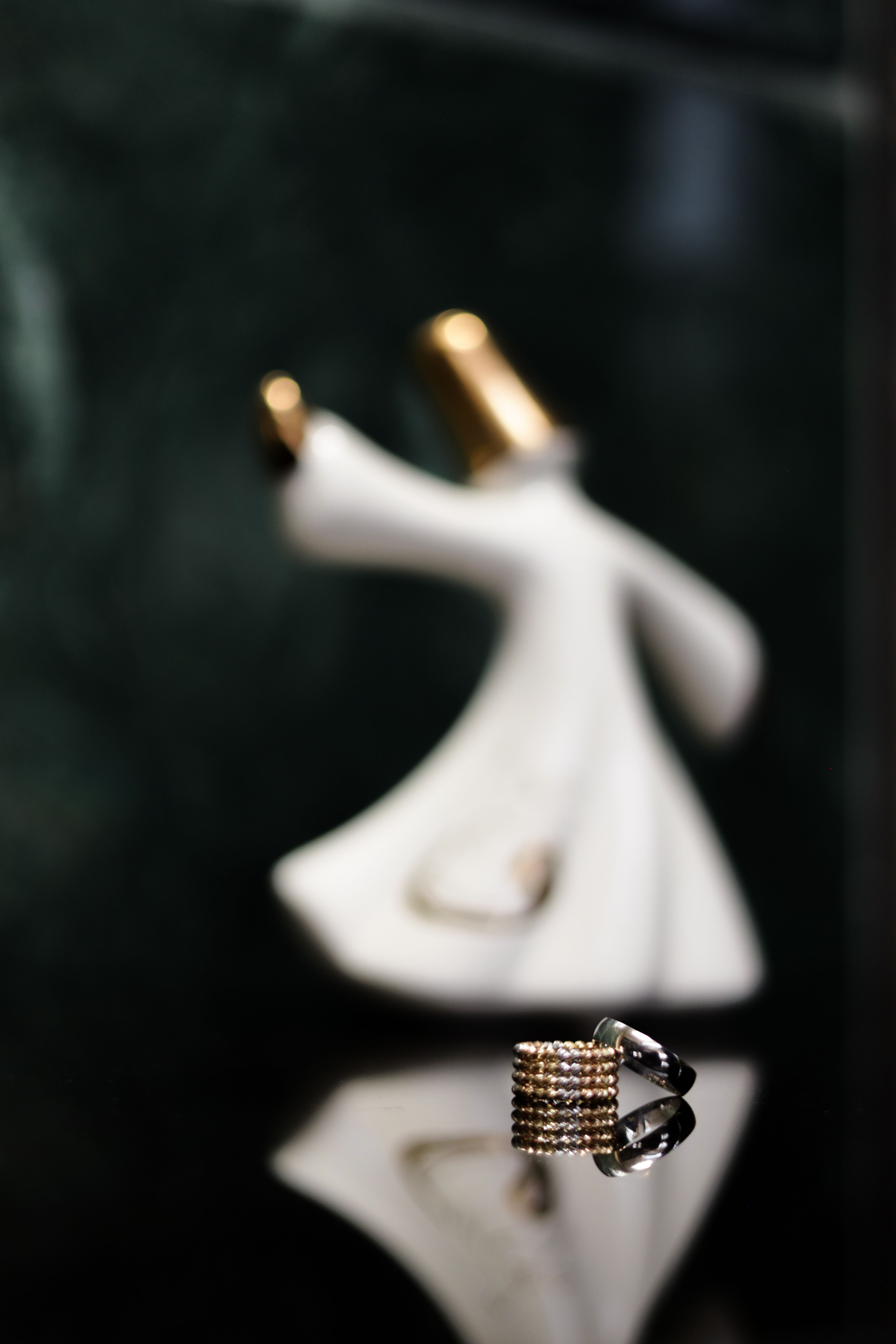 Elegant Jewelry with Abstract Sculpture Reflection · Free Stock Photo