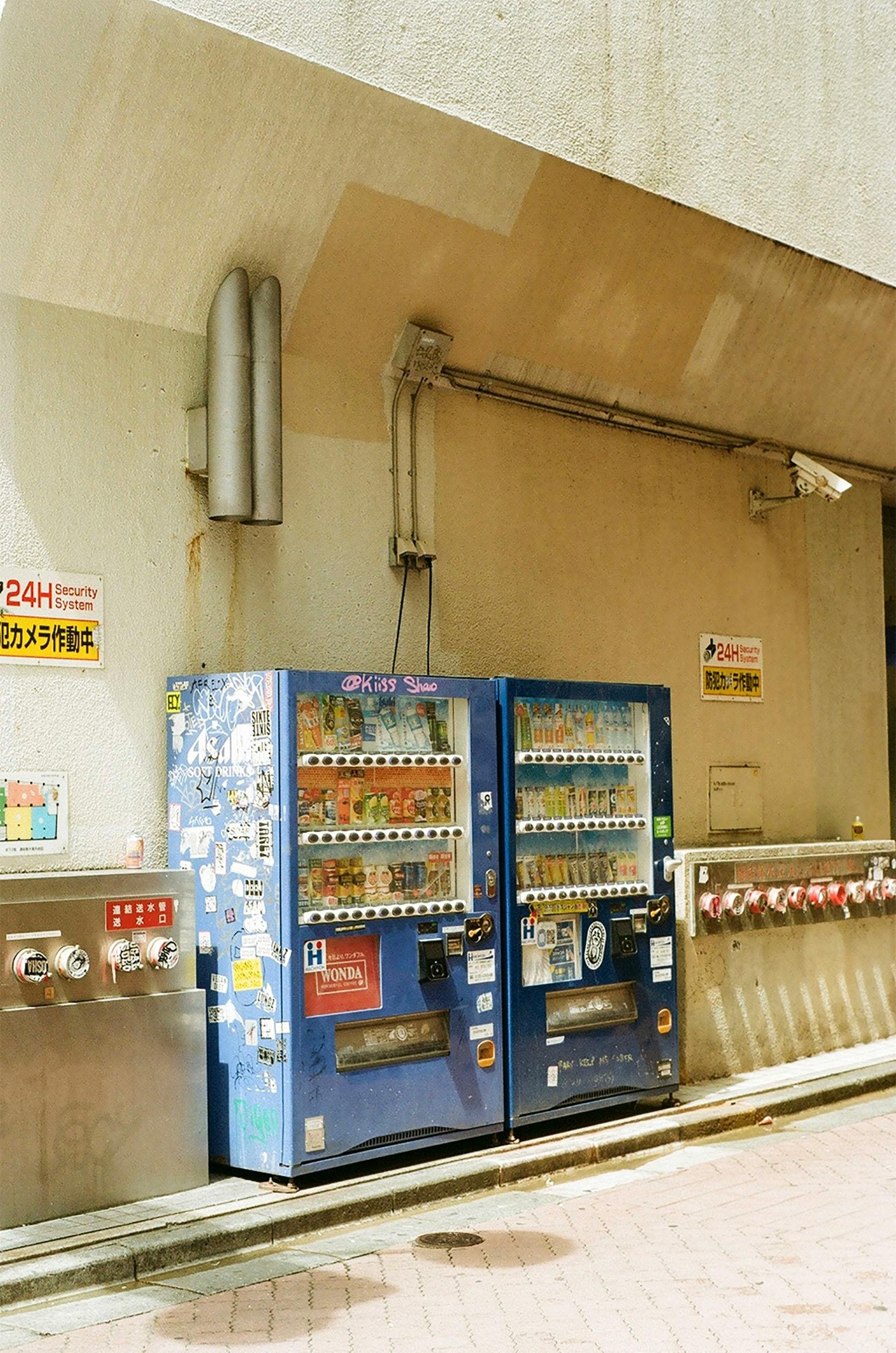 Two Blue Vending Machines in Urban Alley · Free Stock Photo