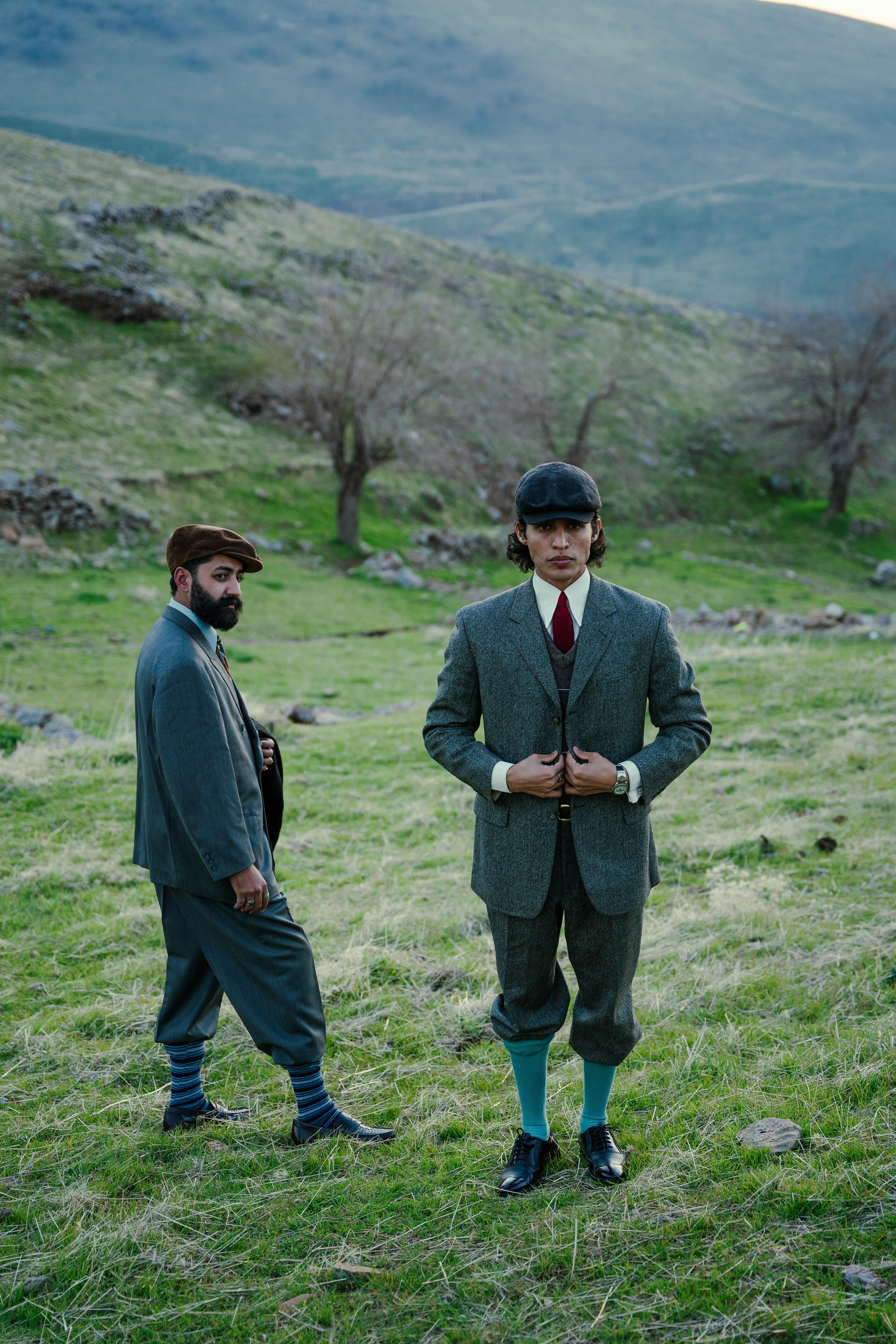 Vintage Style Men in Tweed Suits Outdoors · Free Stock Photo