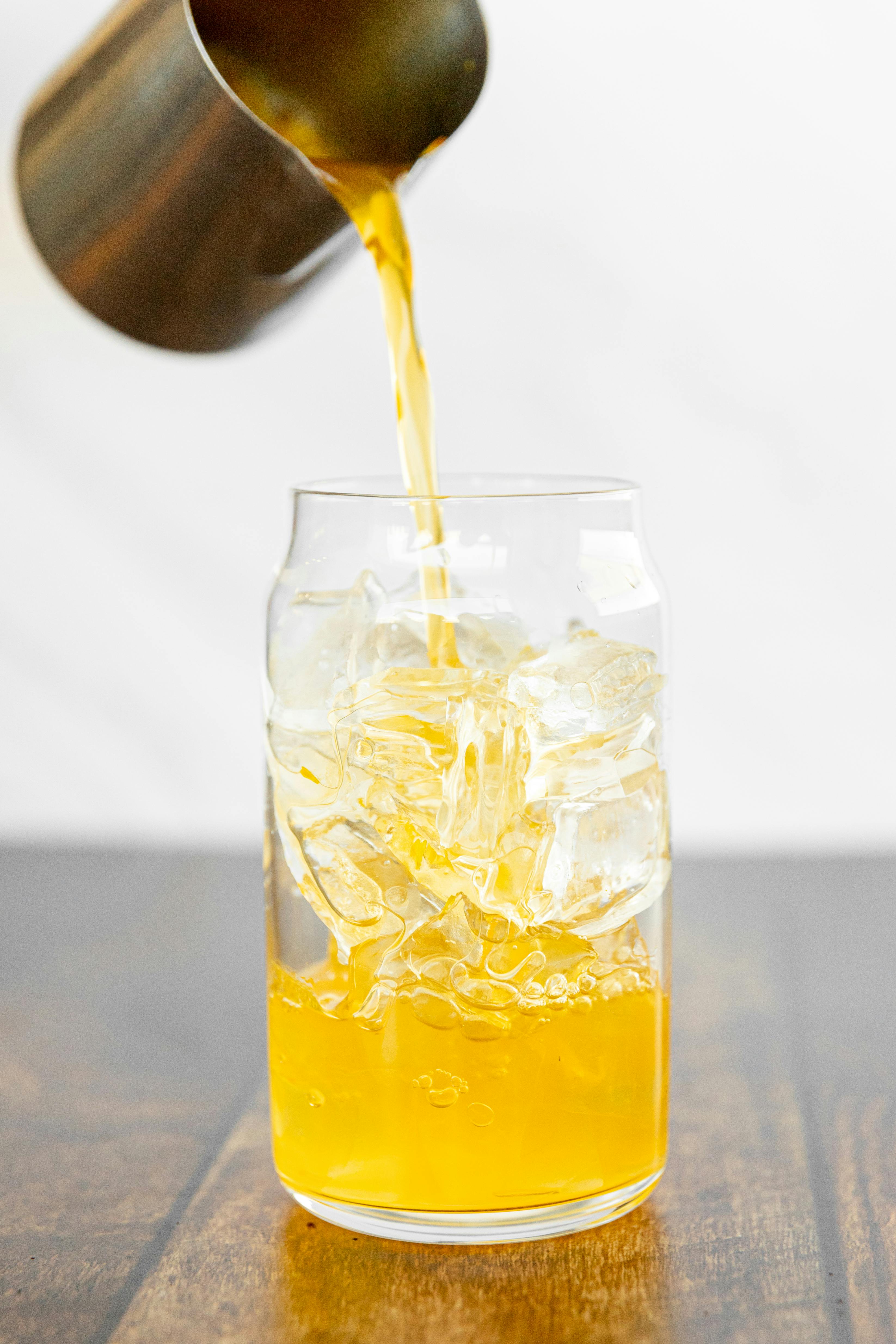 Refreshing Beverage Pour Over Ice · Free Stock Photo