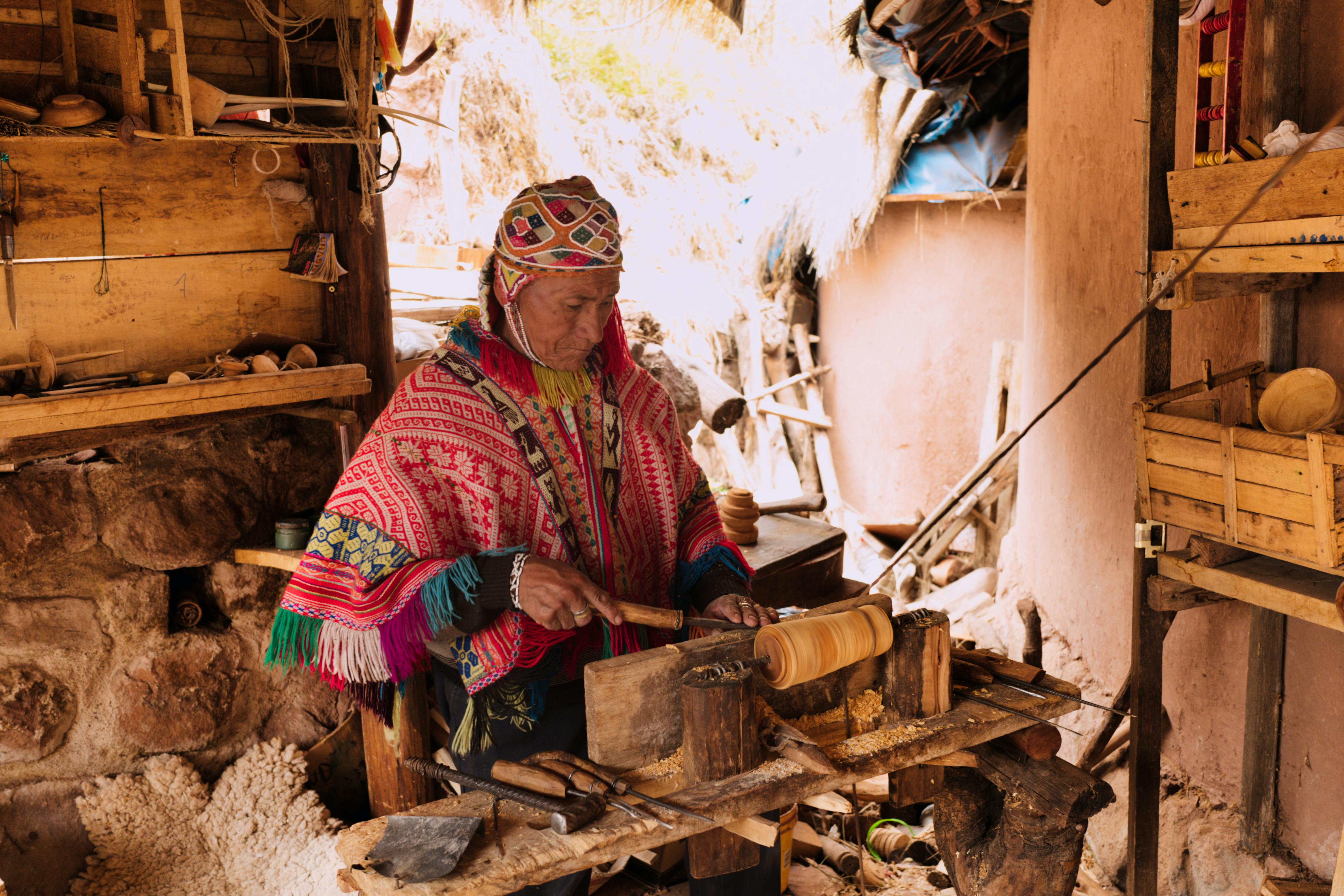 Peruvian Artisan in Traditional Workshop · Free Stock Photo