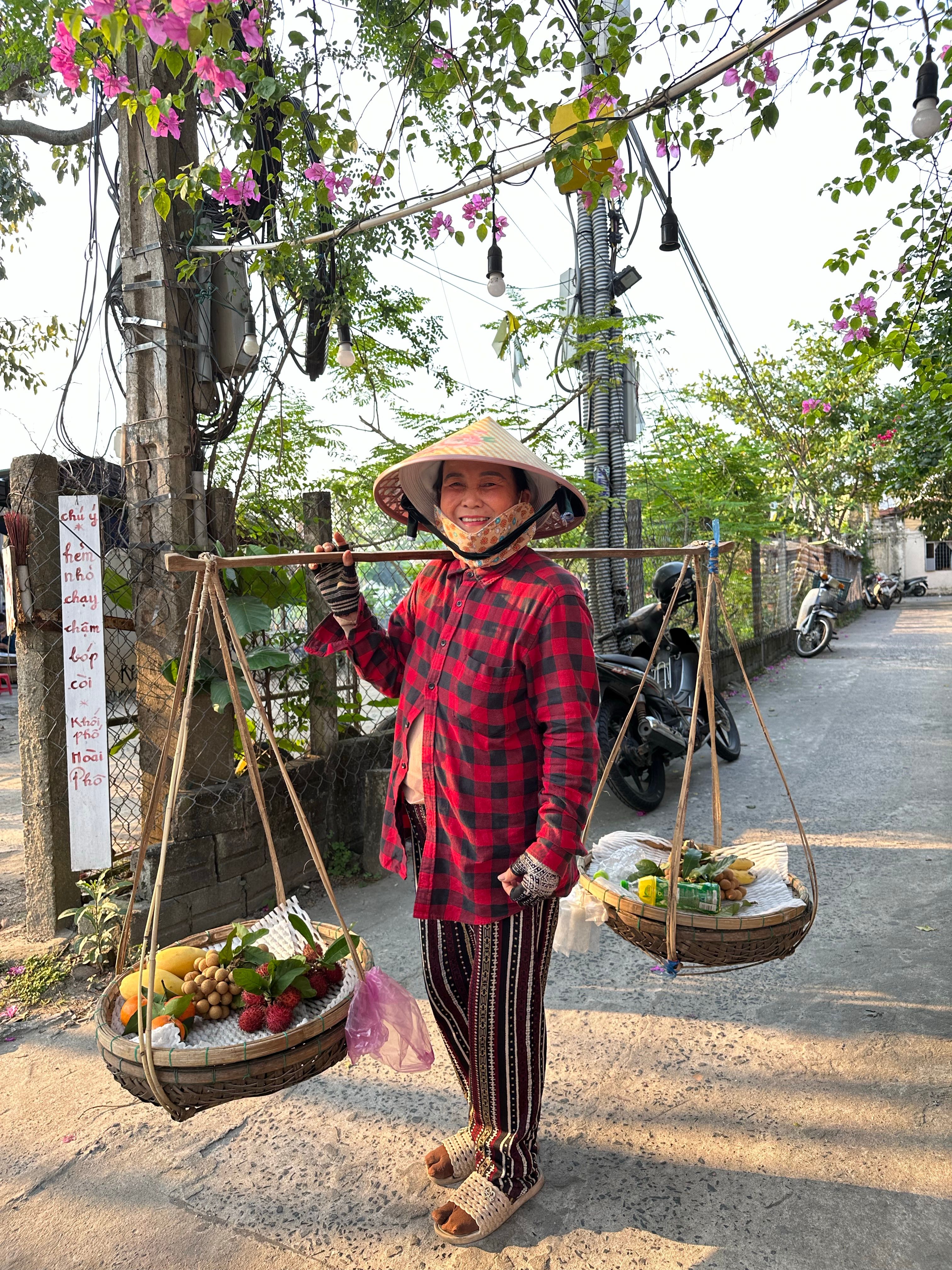 Traditional Street Vendor in Hội An, Vietnam · Free Stock Photo