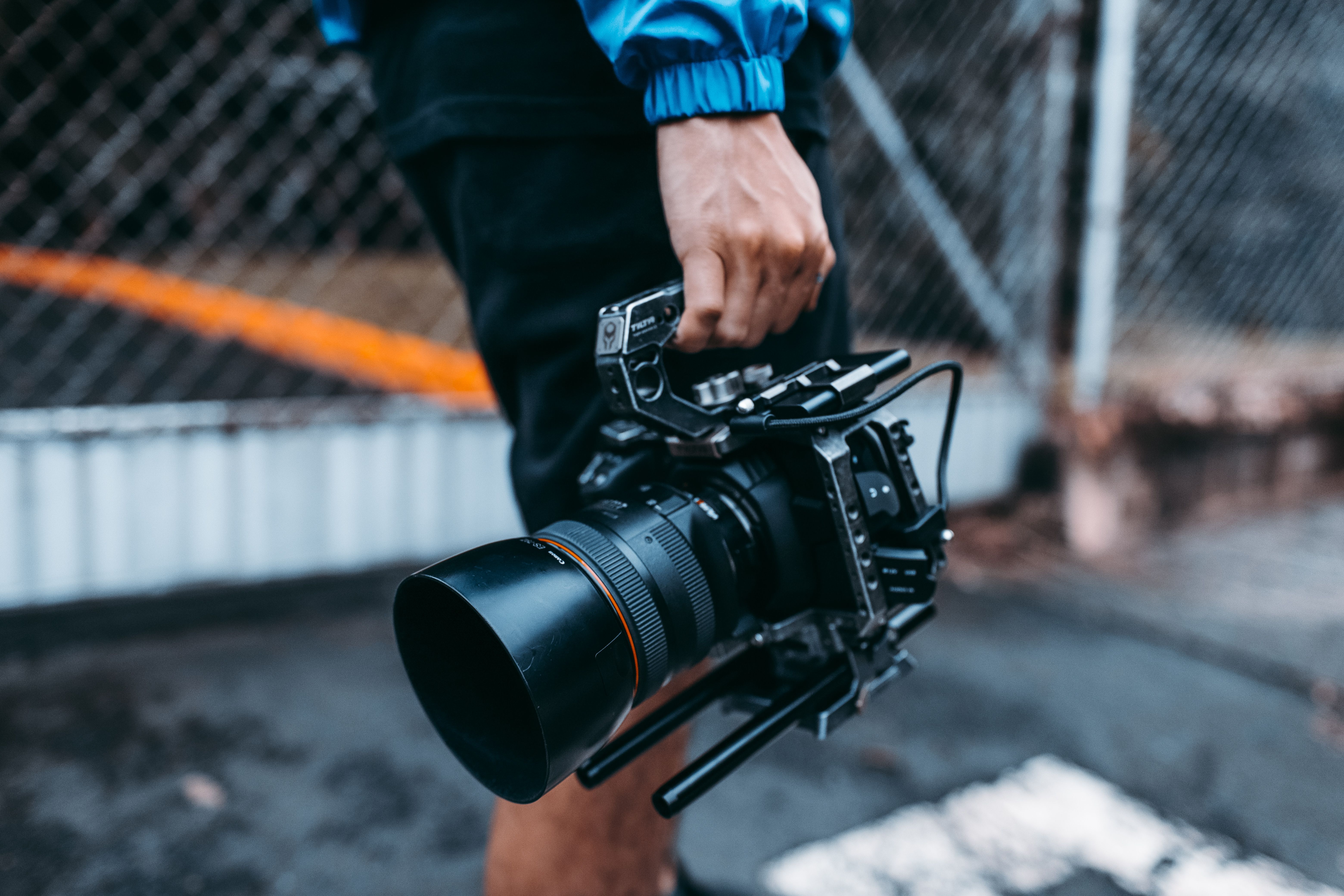 Person Standing While Holding Camera · Free Stock Photo