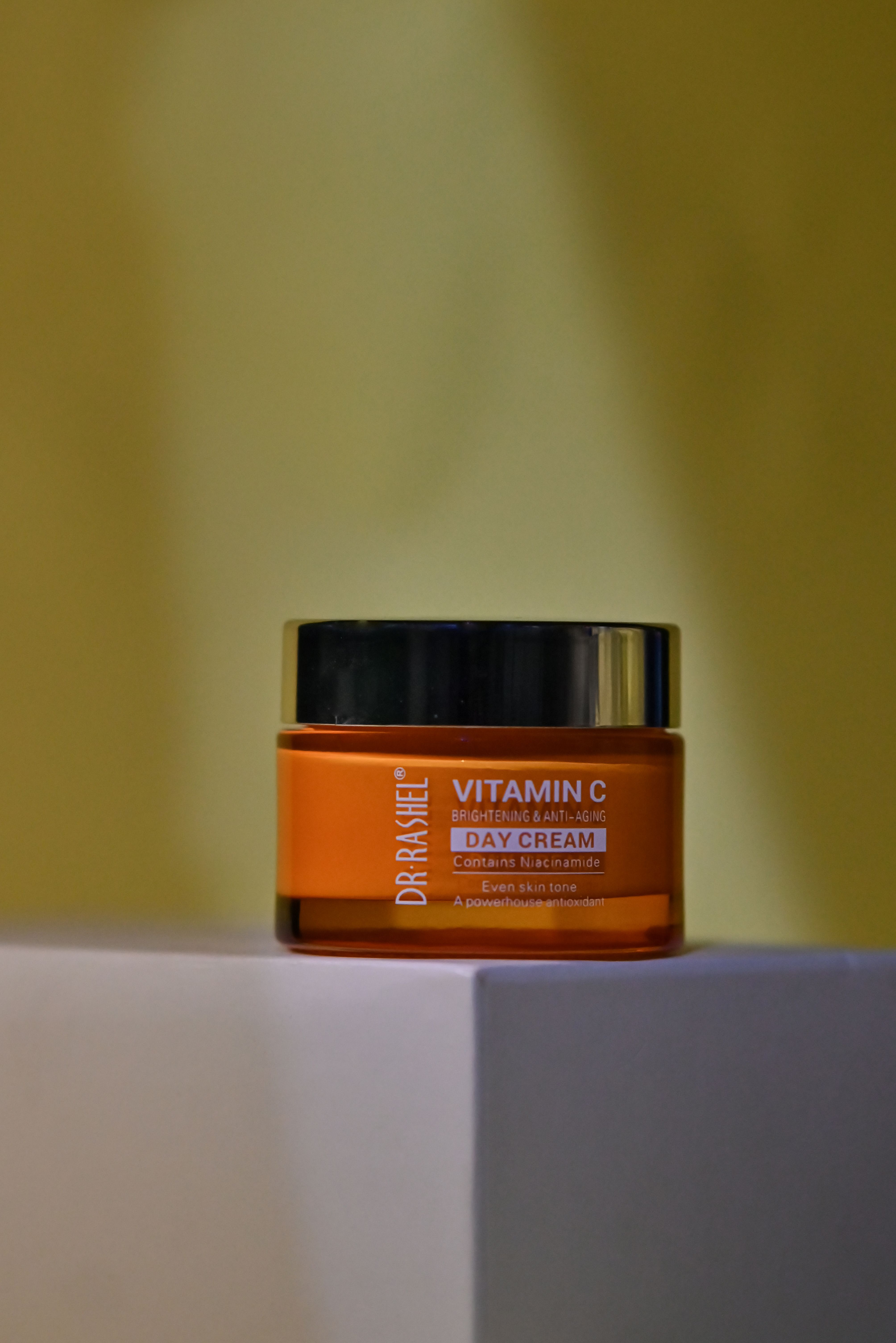 Vitamin C Day Cream in Vibrant Orange Packaging · Free Stock Photo