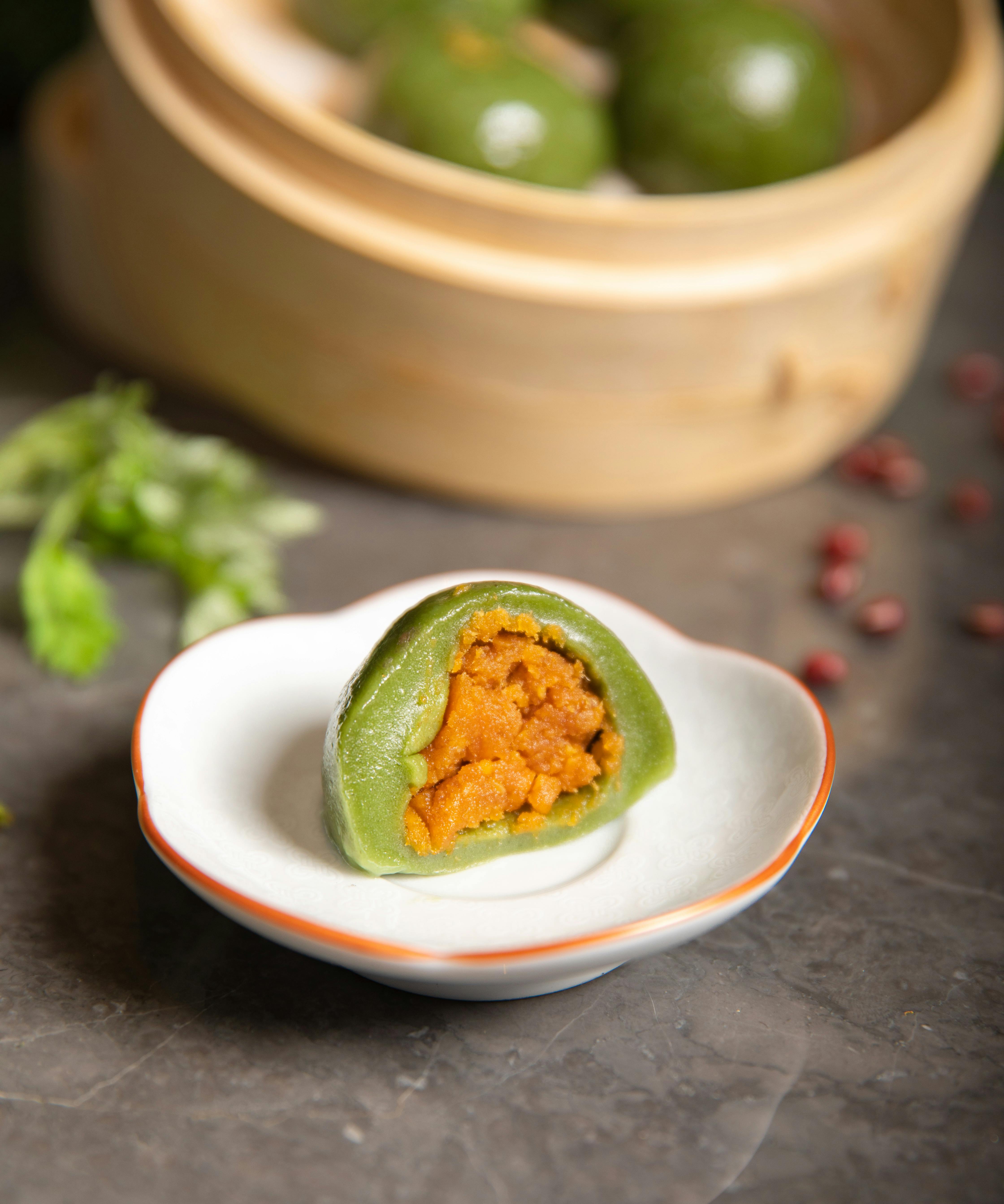 Green Dumpling with Savory Filling on Plate · Free Stock Photo