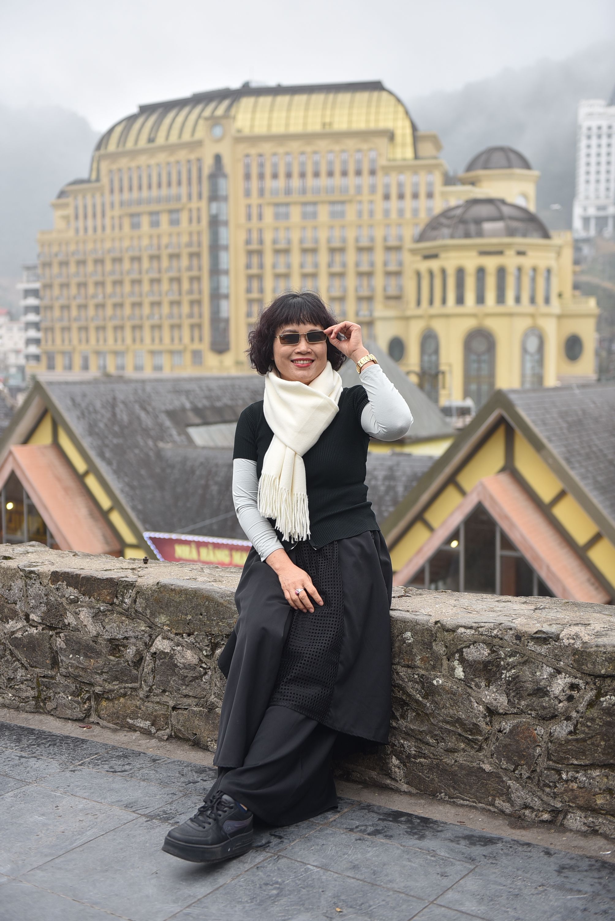 Woman Posing in Front of Unique Architectural Building · Free Stock Photo