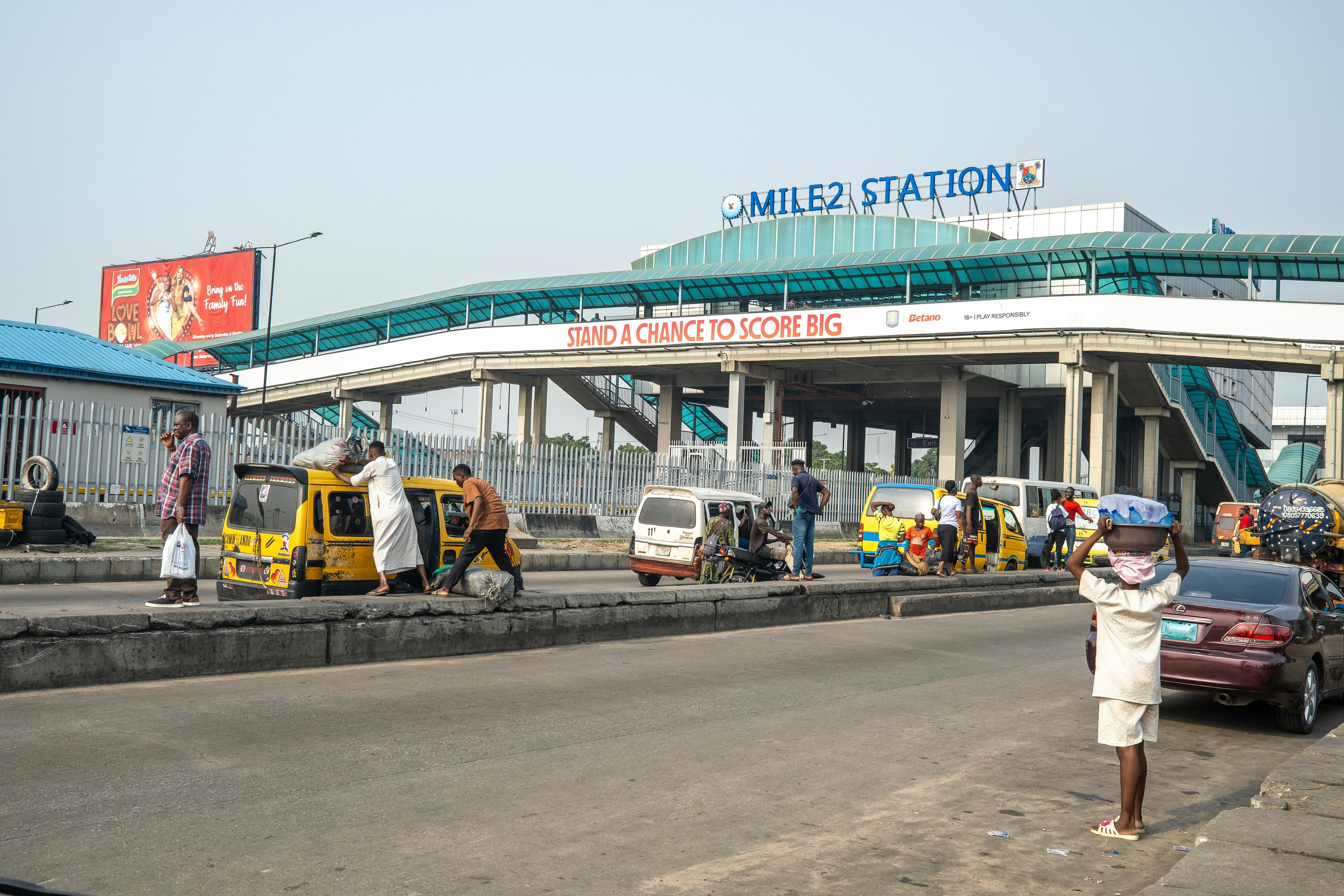 Bustling Scene at Mile 2 Station in Lagos · Free Stock Photo
