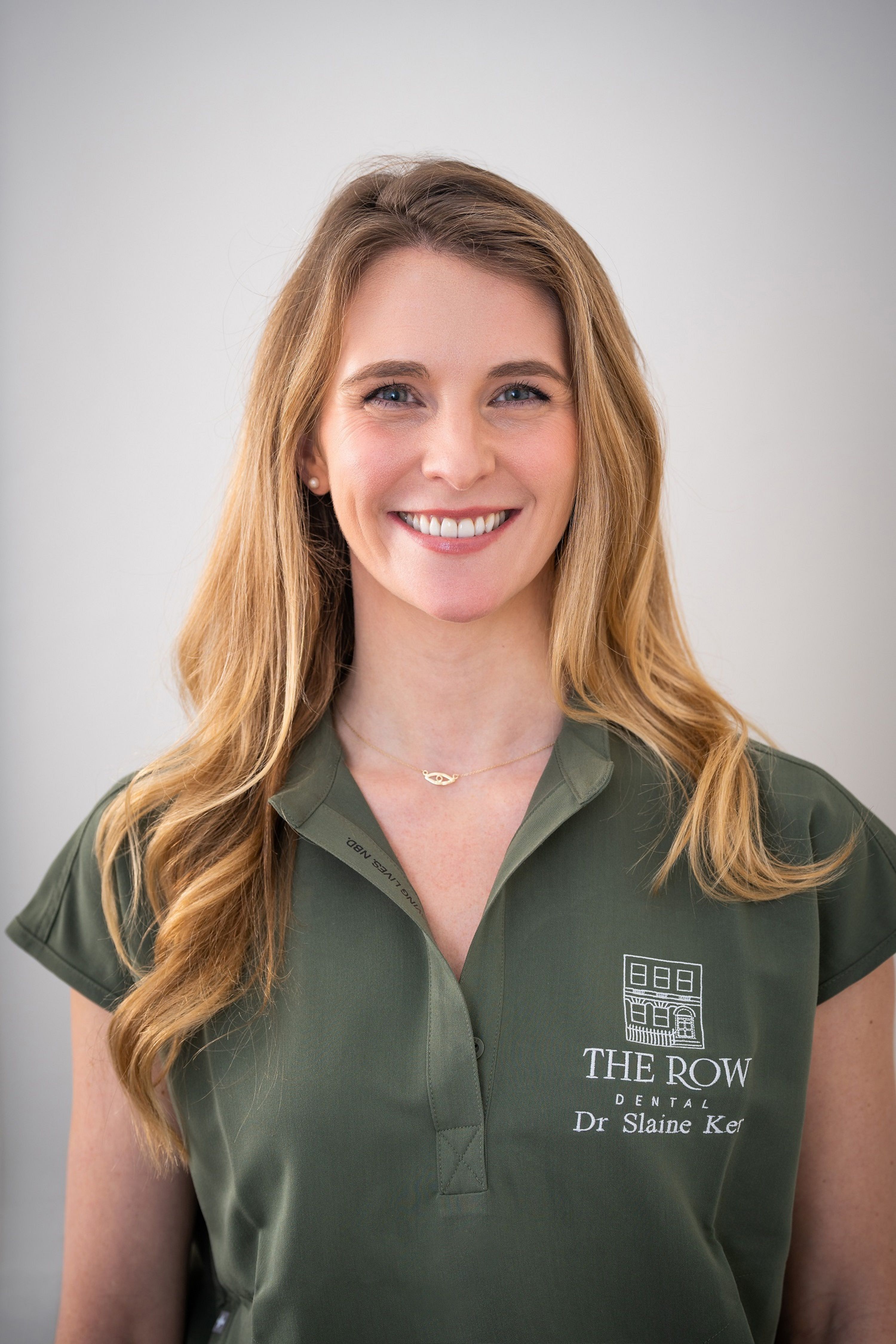 Professional Portrait of a Female Dentist · Free Stock Photo