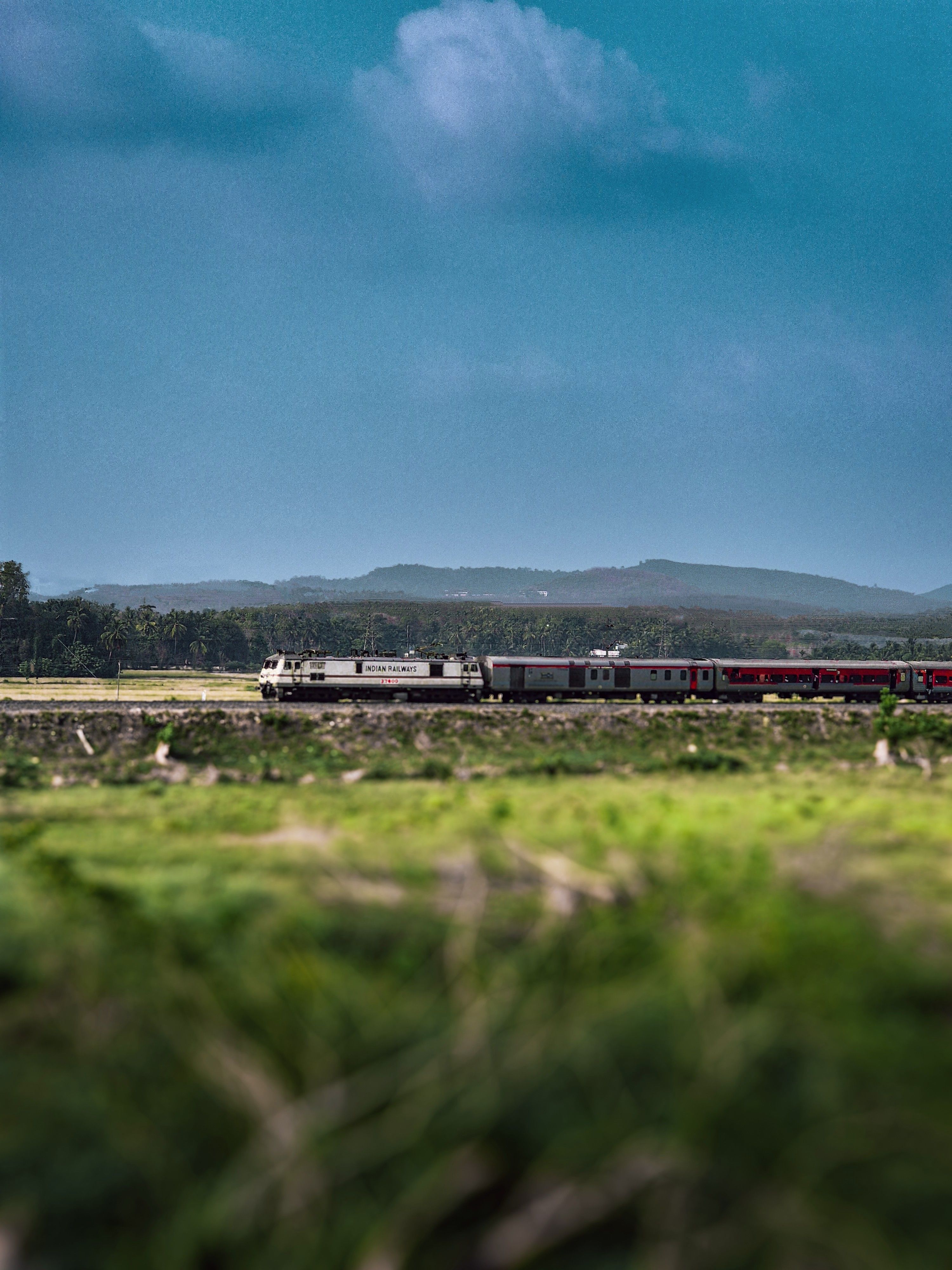 Distant Train Journey Through Indian Countryside · Free Stock Photo