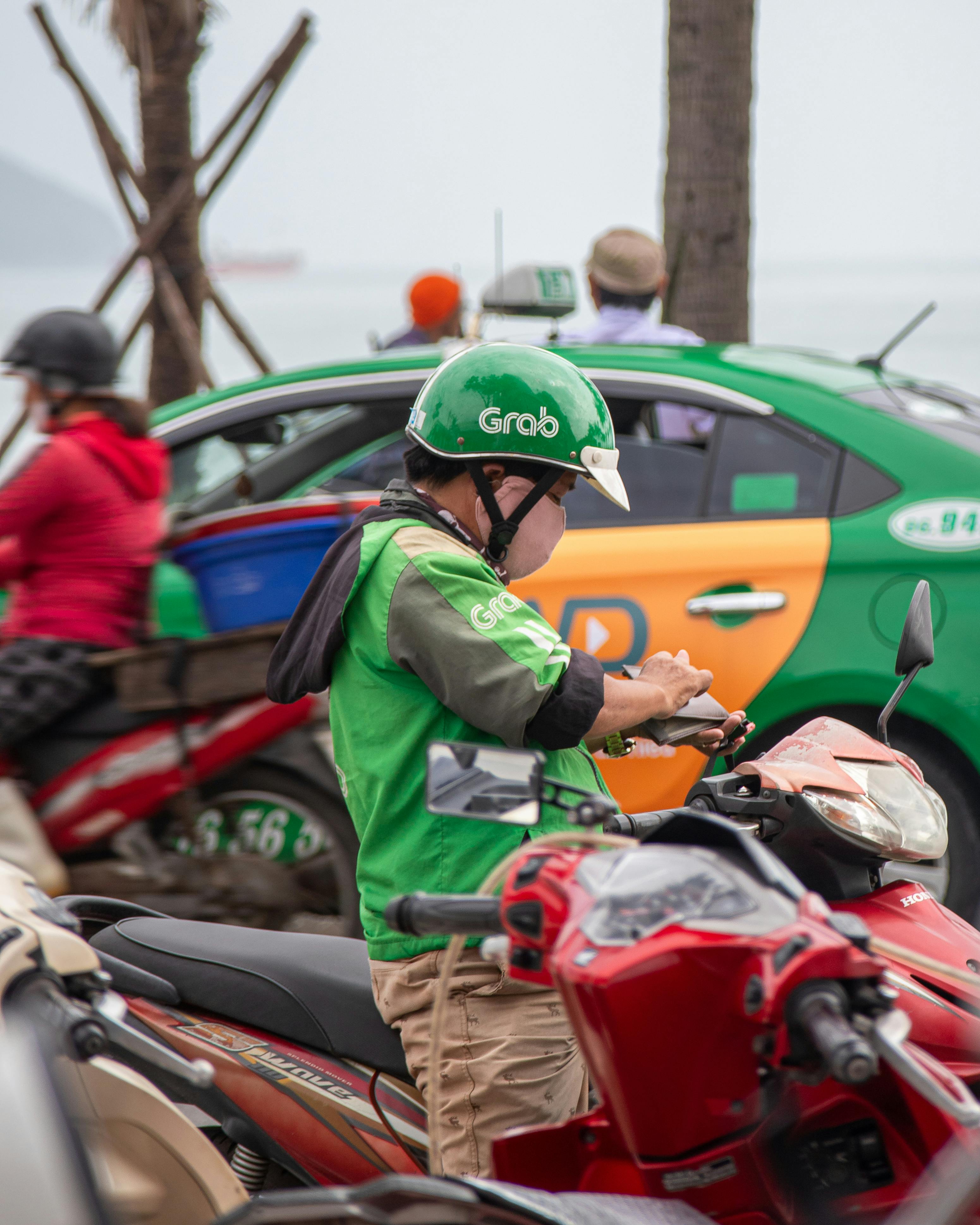 Grab Motorcycle Driver in Da Nang, Vietnam · Free Stock Photo