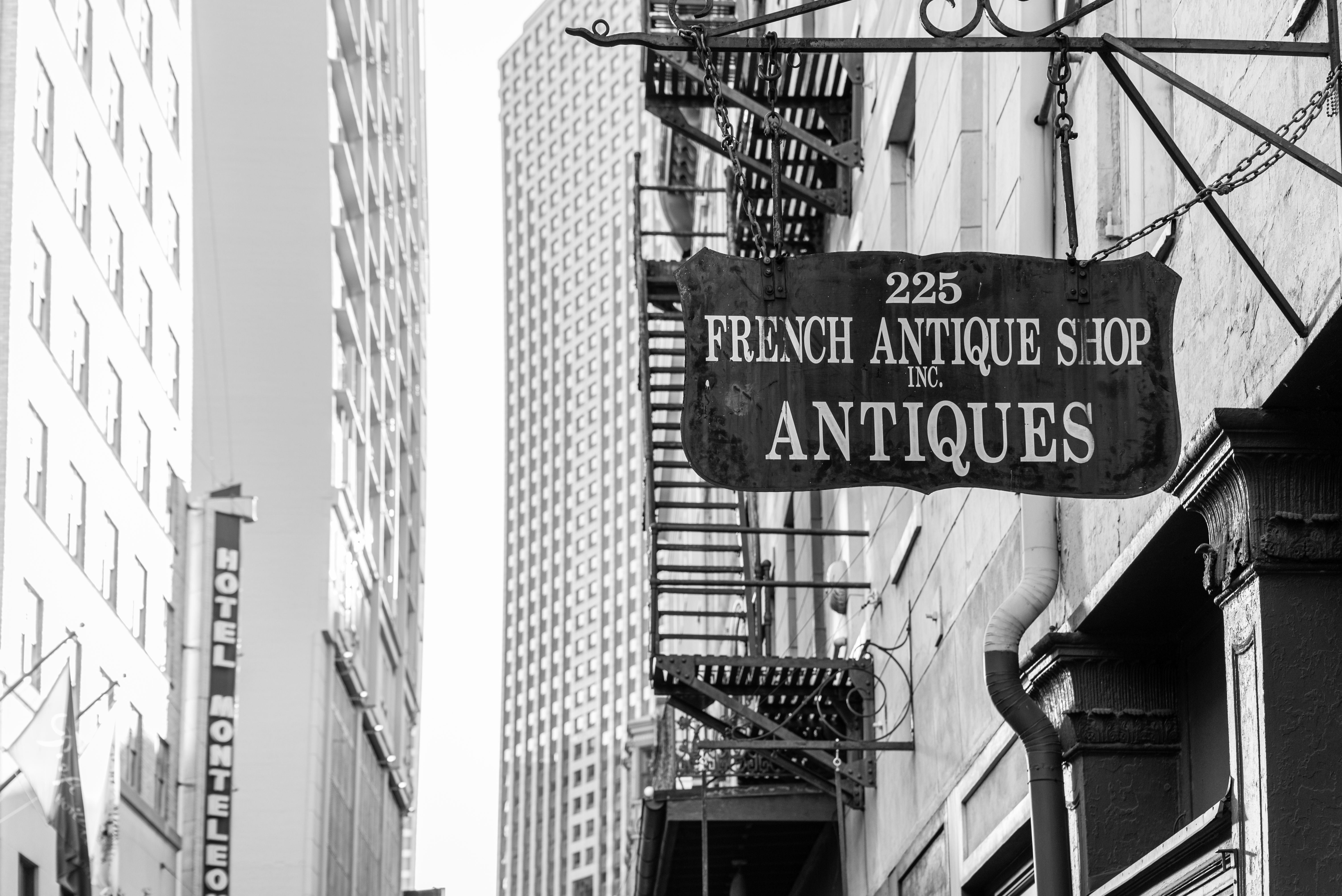 Vintage French Antique Shop Sign in New Orleans · Free Stock Photo