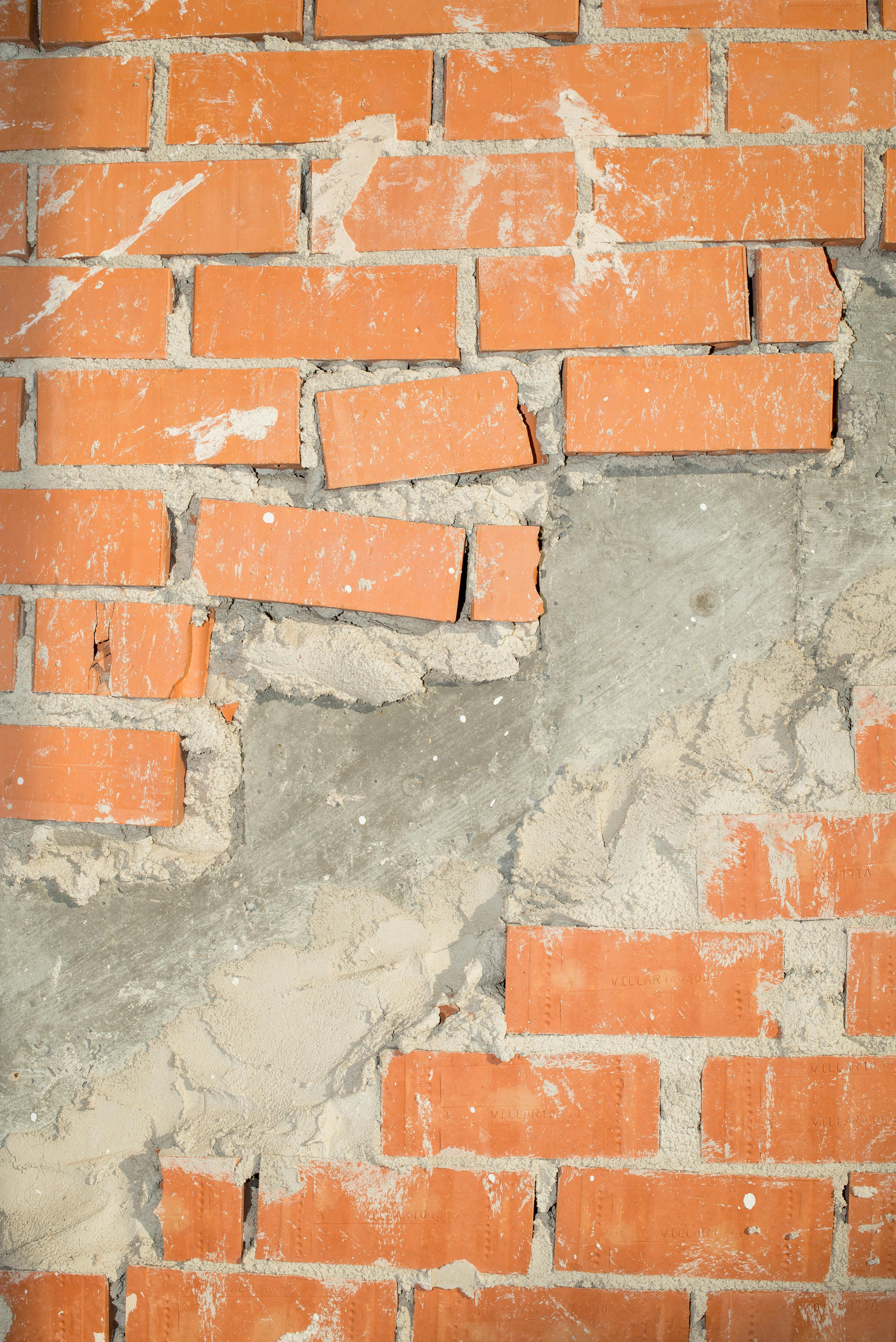 Close-up of Crumbling Brick Wall Texture · Free Stock Photo