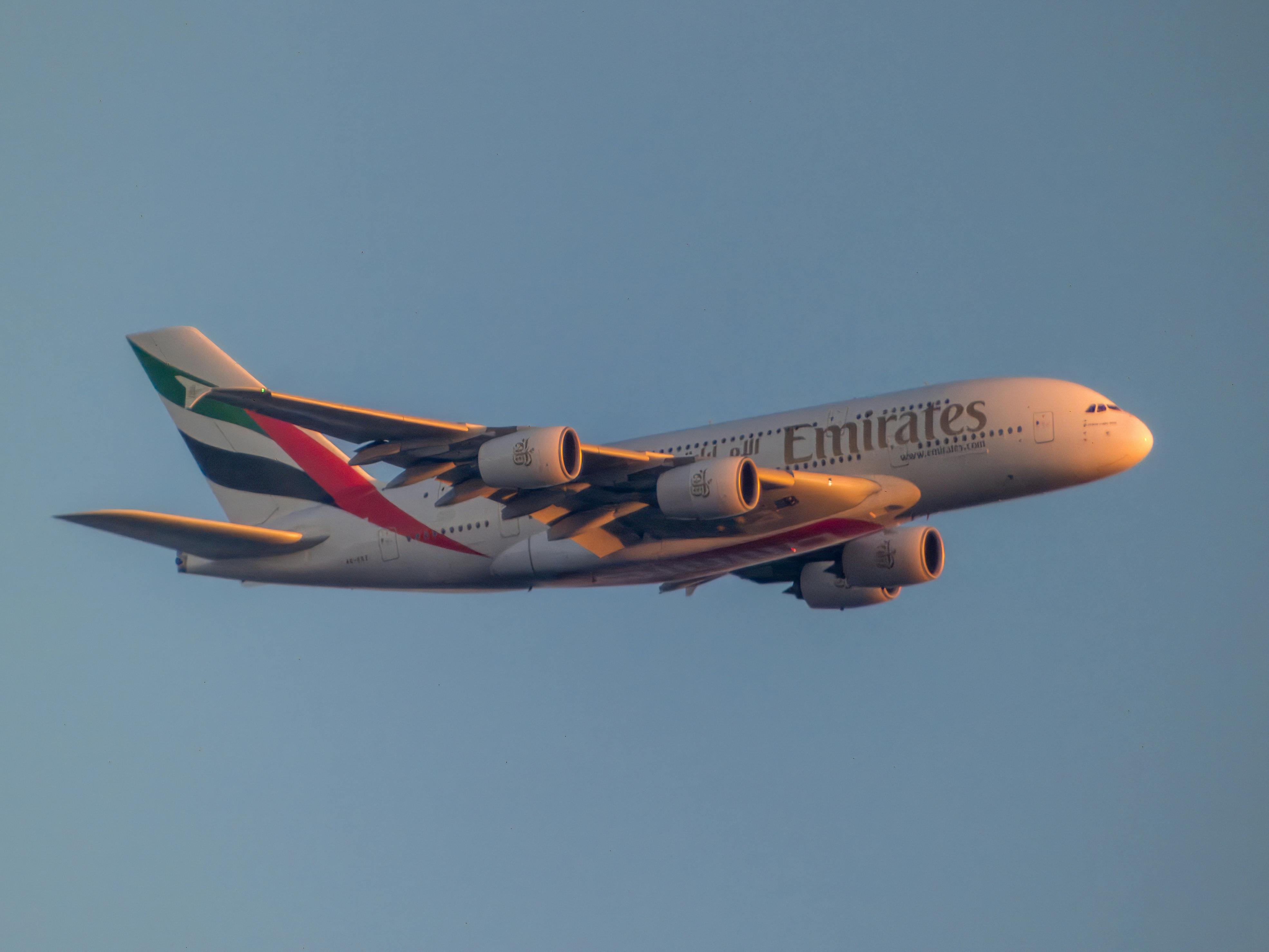Emirates Airbus A380 in Flight at Sunset · Free Stock Photo