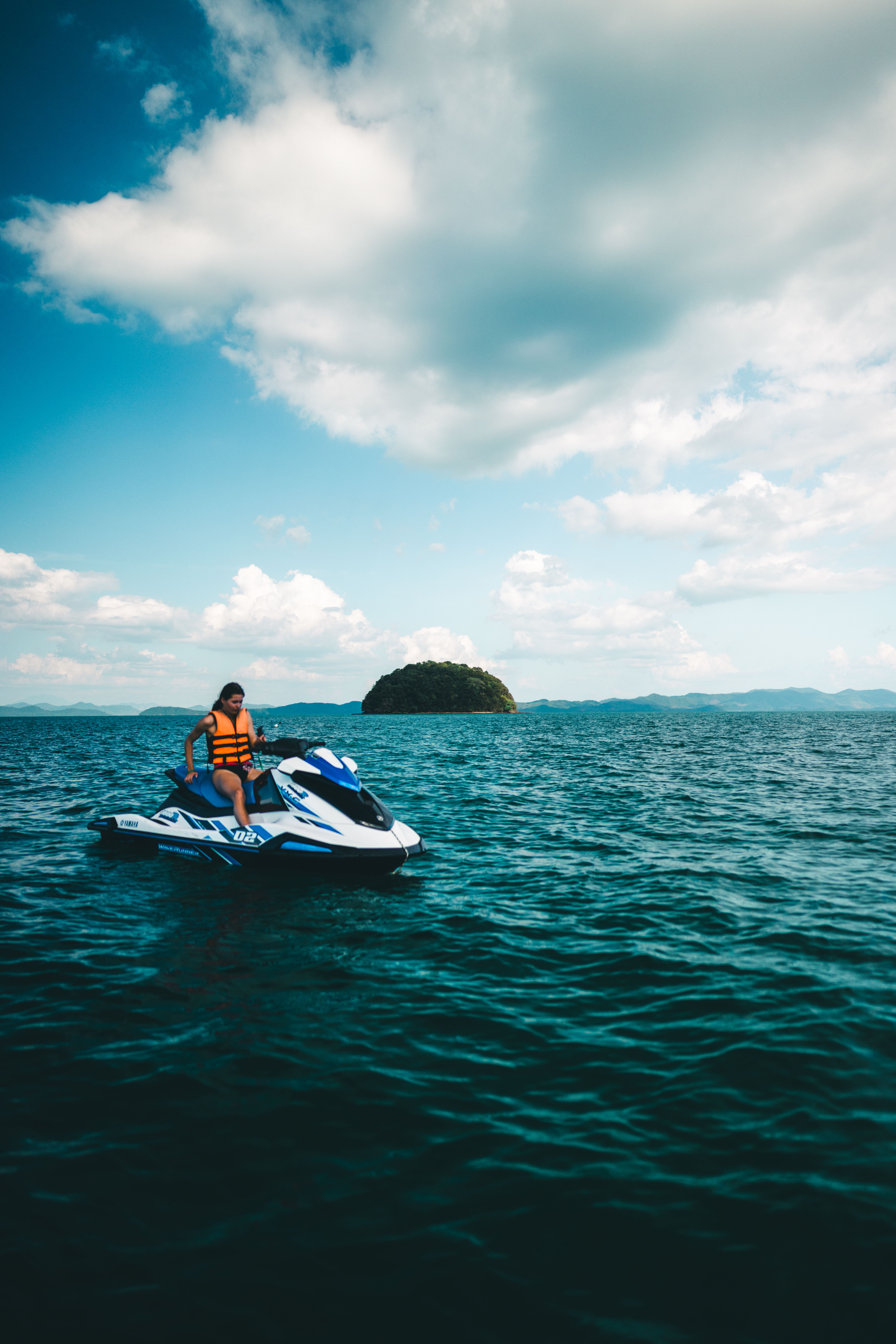 Empty Yellow and Black Jet Ski in Teal Sea Water · Free Stock Photo