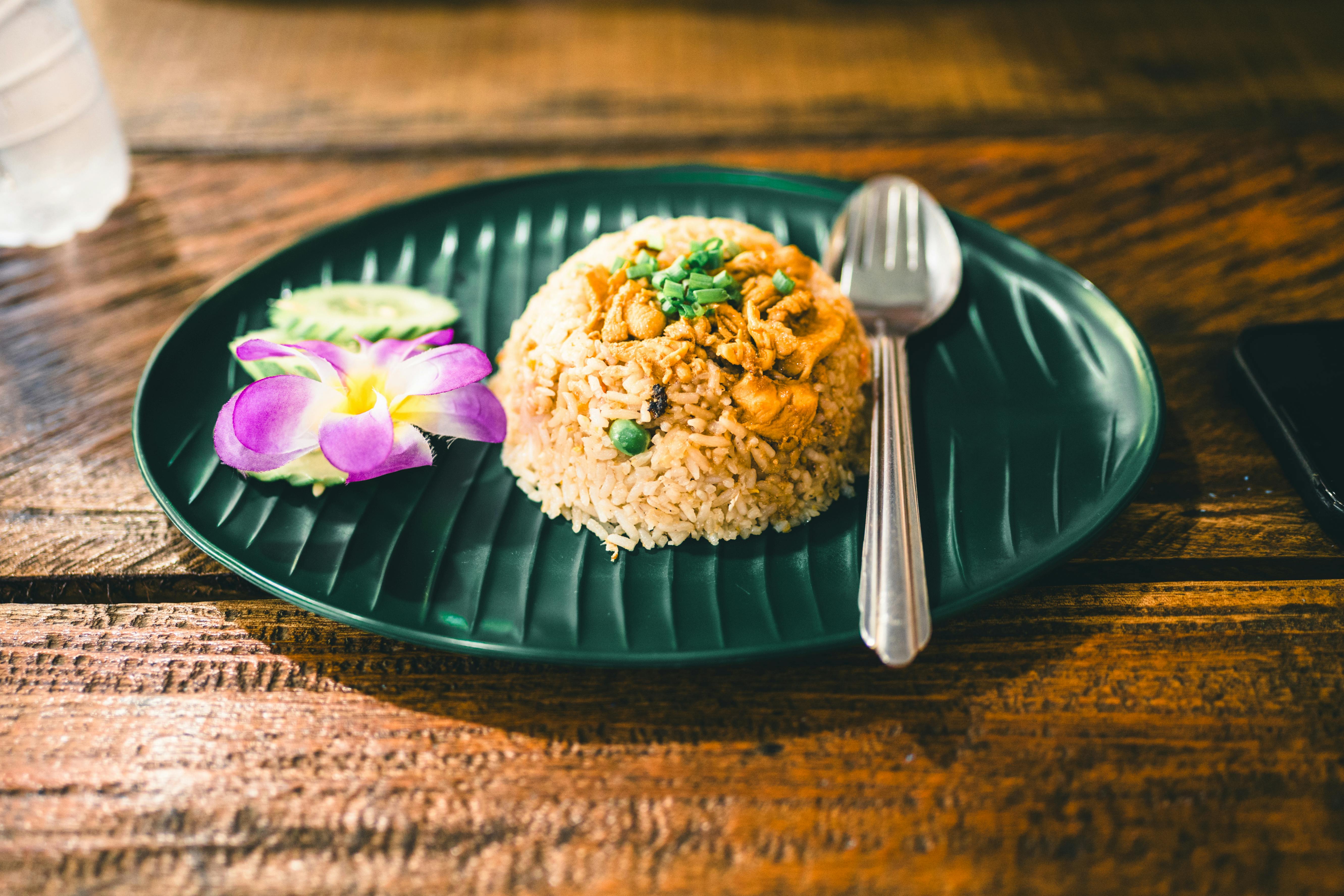 Authentic Thai Fried Rice on Rustic Table · Free Stock Photo