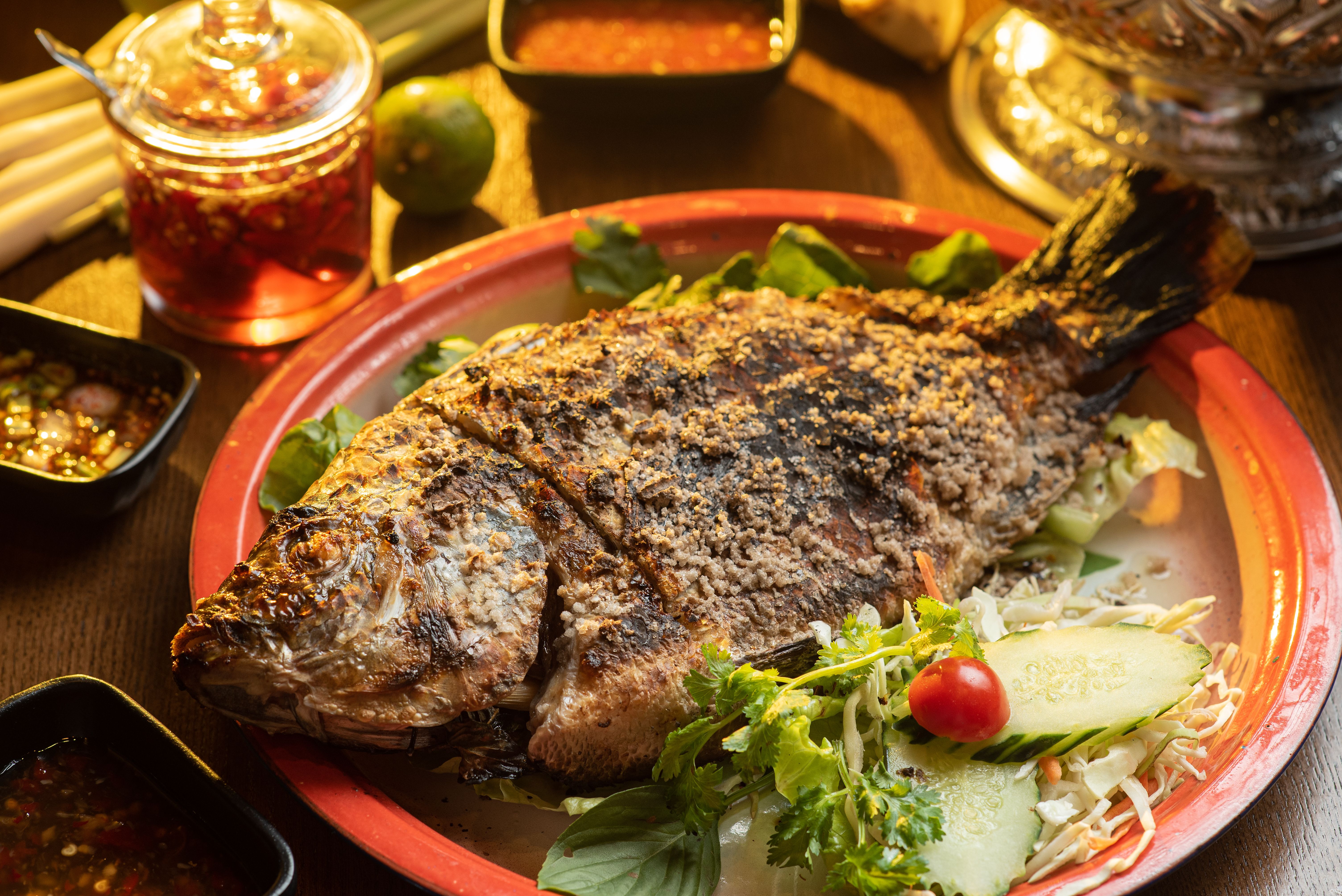 Grilled Whole Fish Served with Fresh Vegetables · Free Stock Photo