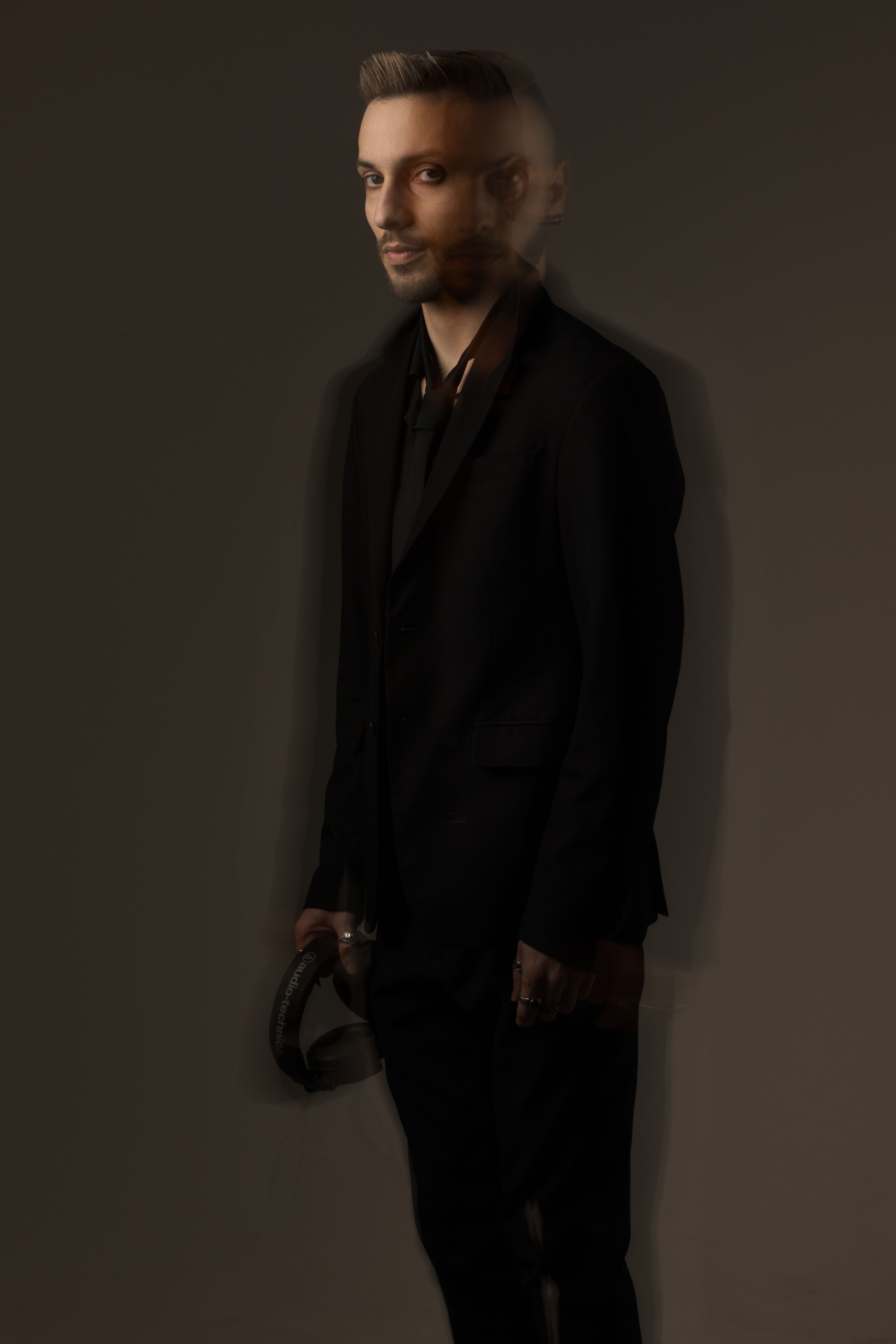 Artistic Portrait of Man in Black with Motion Blur · Free Stock Photo