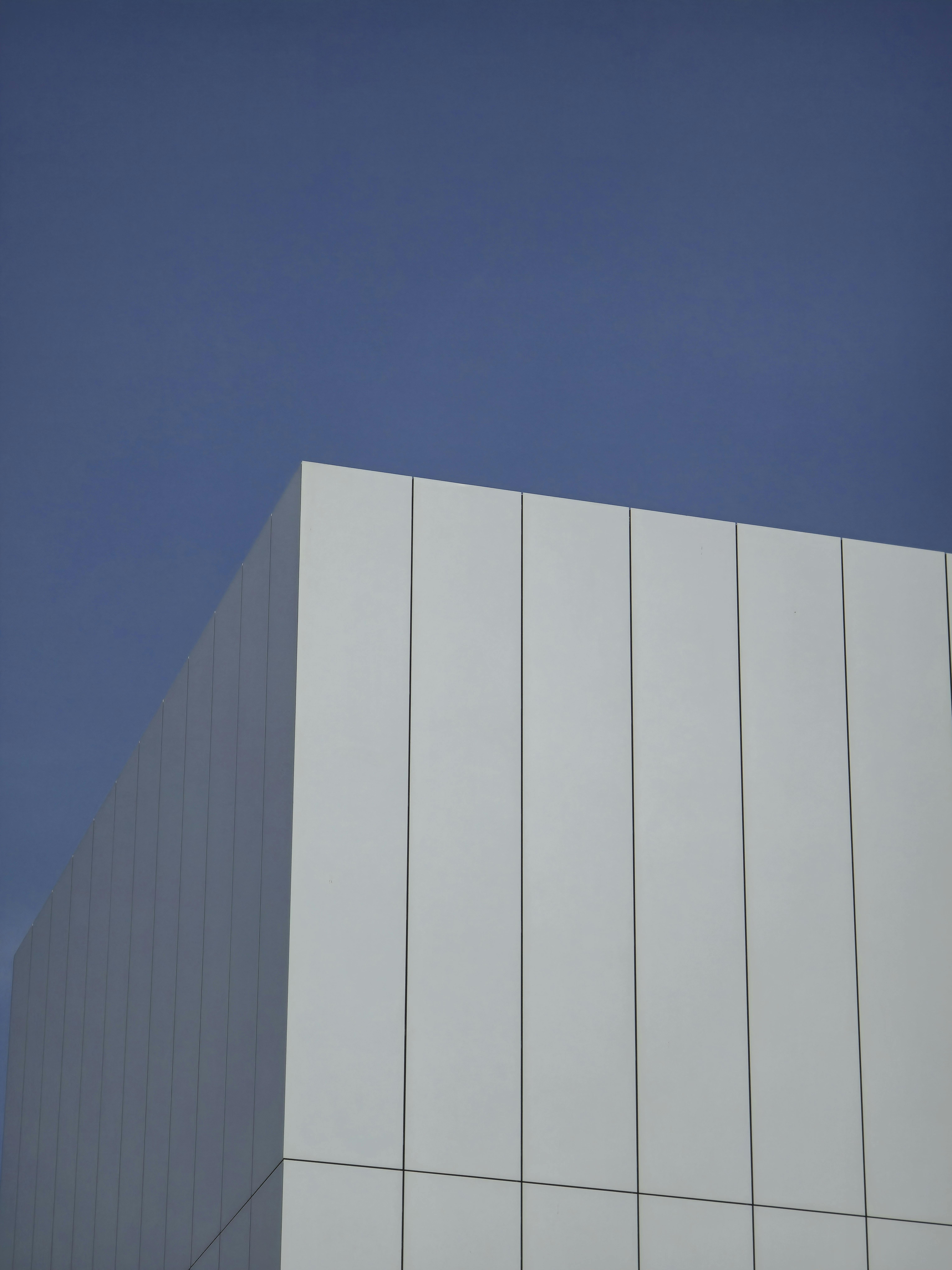 Modern Architectural Angle Against Blue Sky · Free Stock Photo