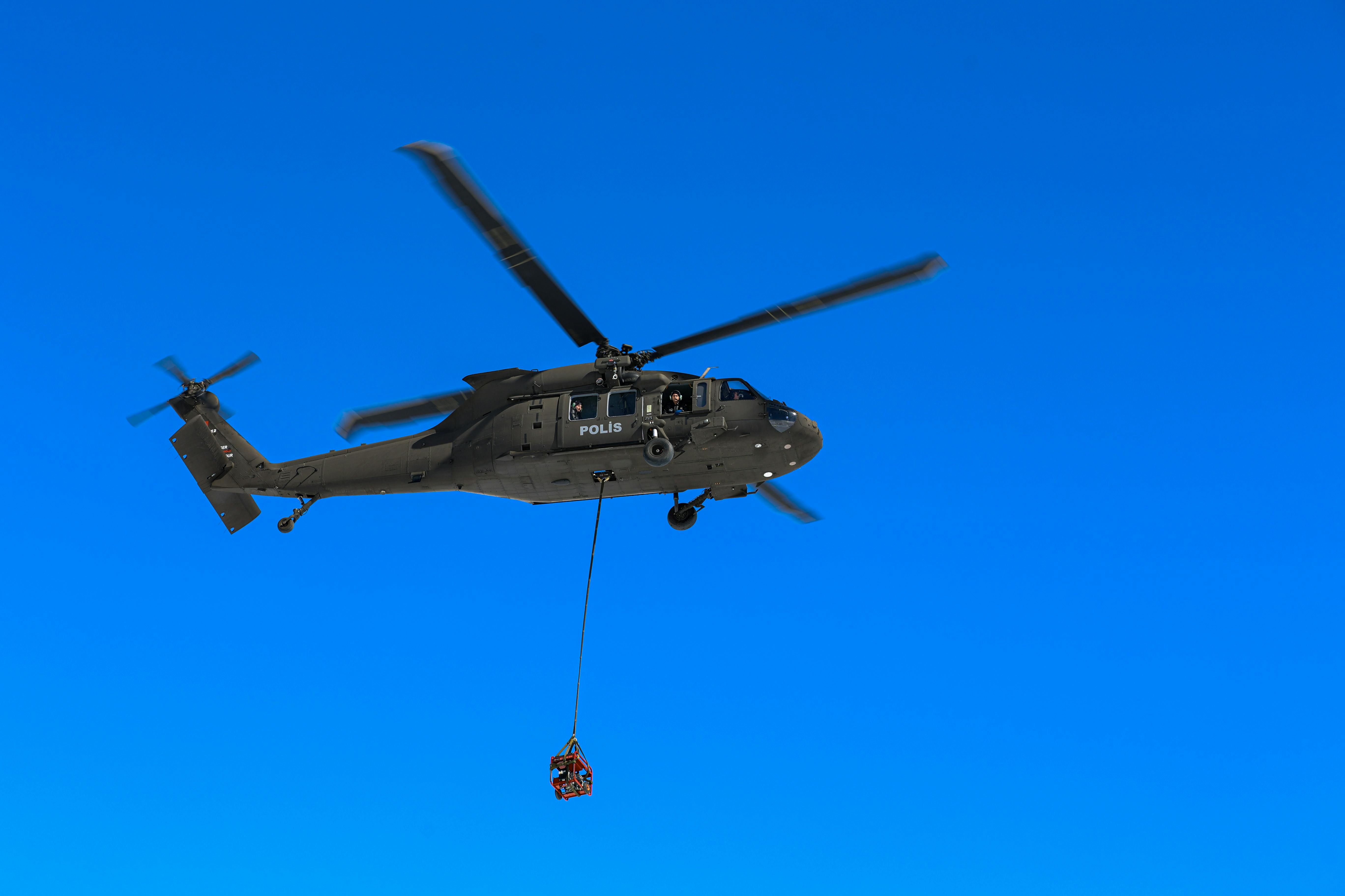 Police Helicopter Patrol in Clear Sky · Free Stock Photo