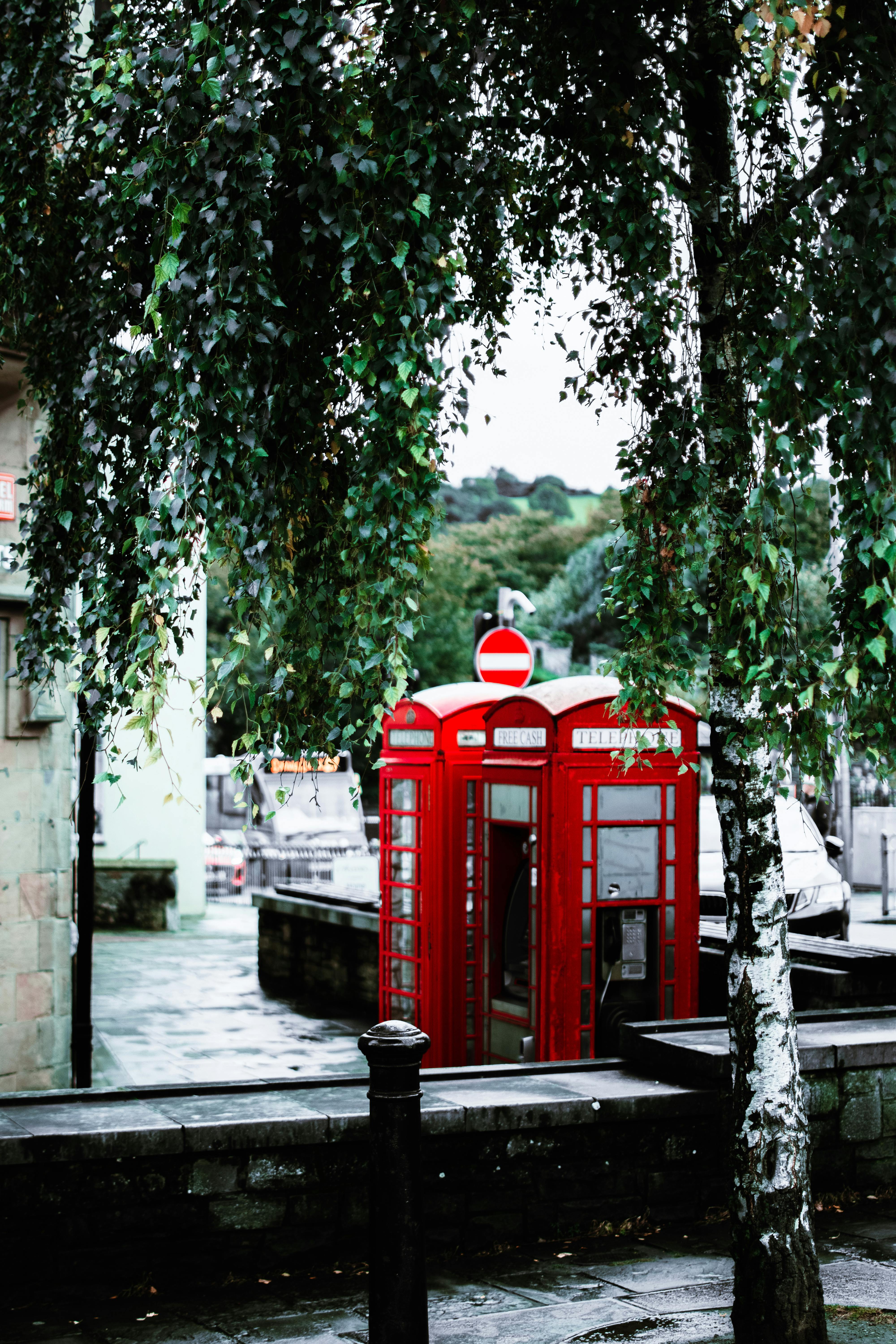 Two Red Phone Booths · Free Stock Photo