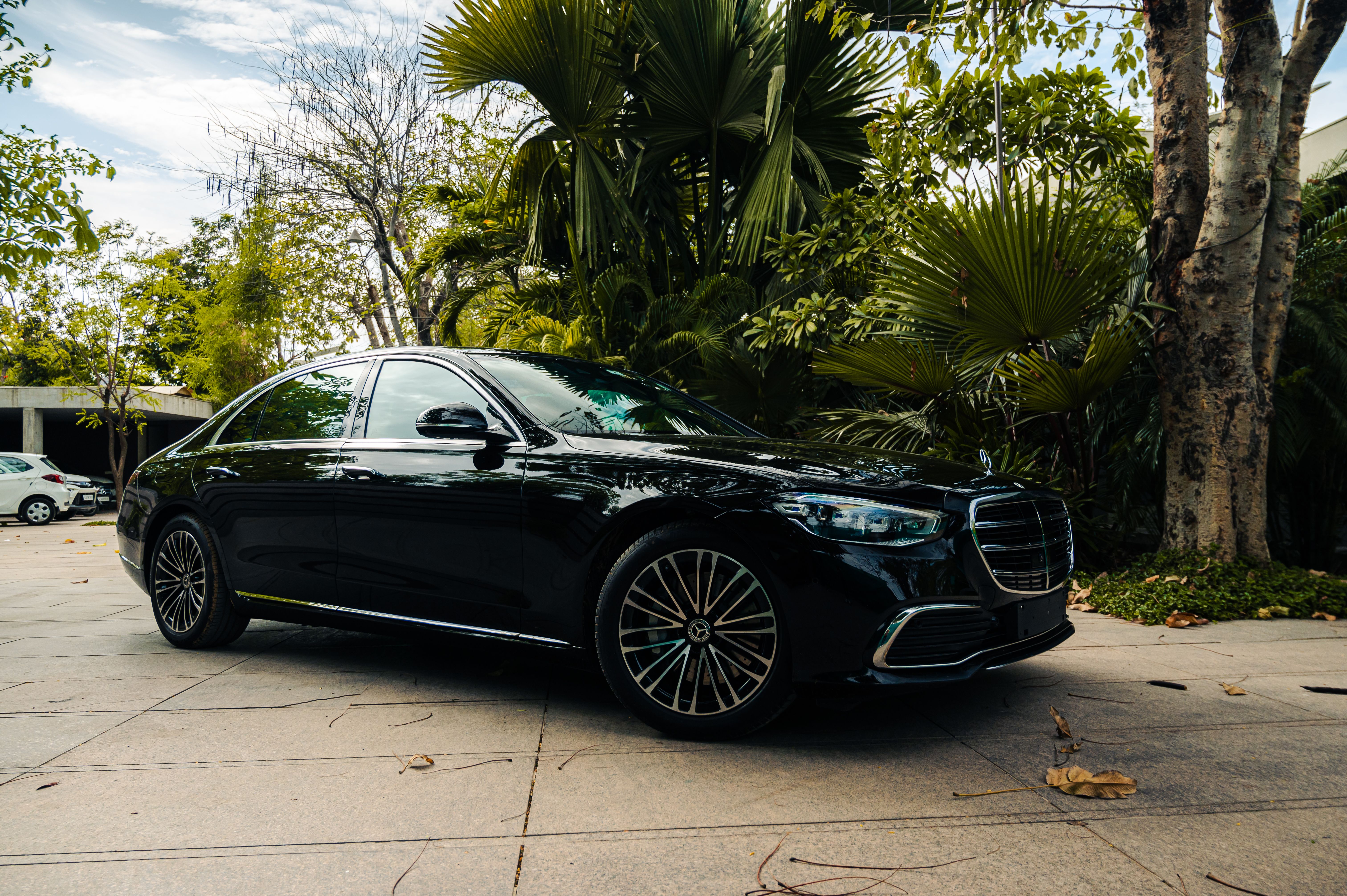 Luxury Black Mercedes Benz Parked Outdoors · Free Stock Photo