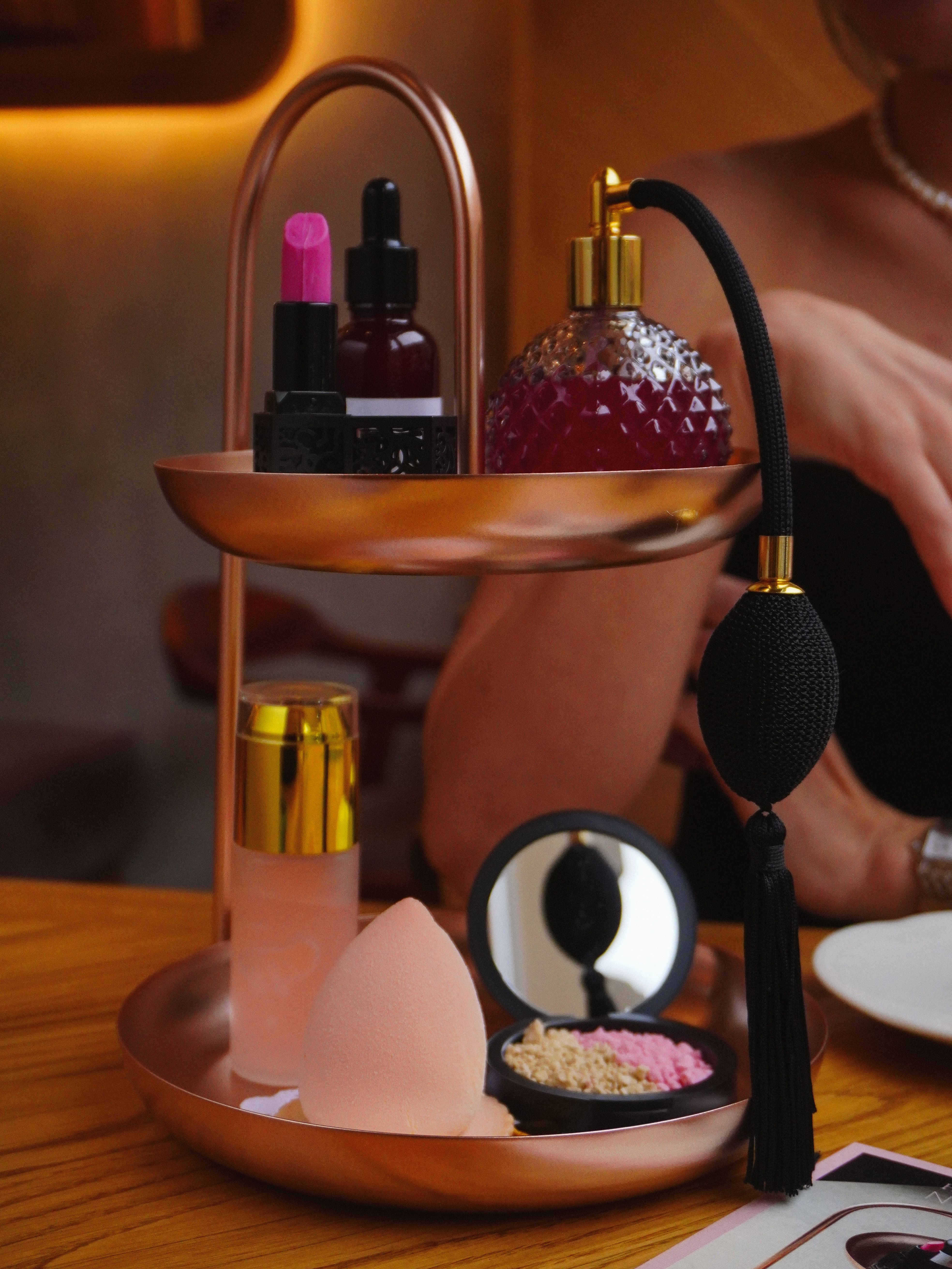 Elegant Makeup Display with Perfume and Cosmetics · Free Stock Photo