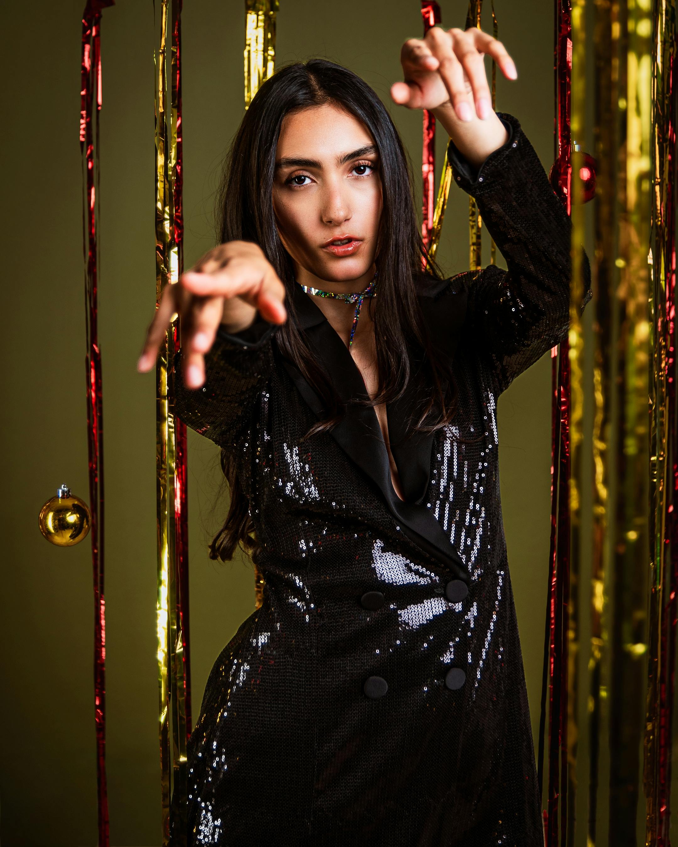 Stylish Fashion Portrait with Glittering Streamers · Free Stock Photo