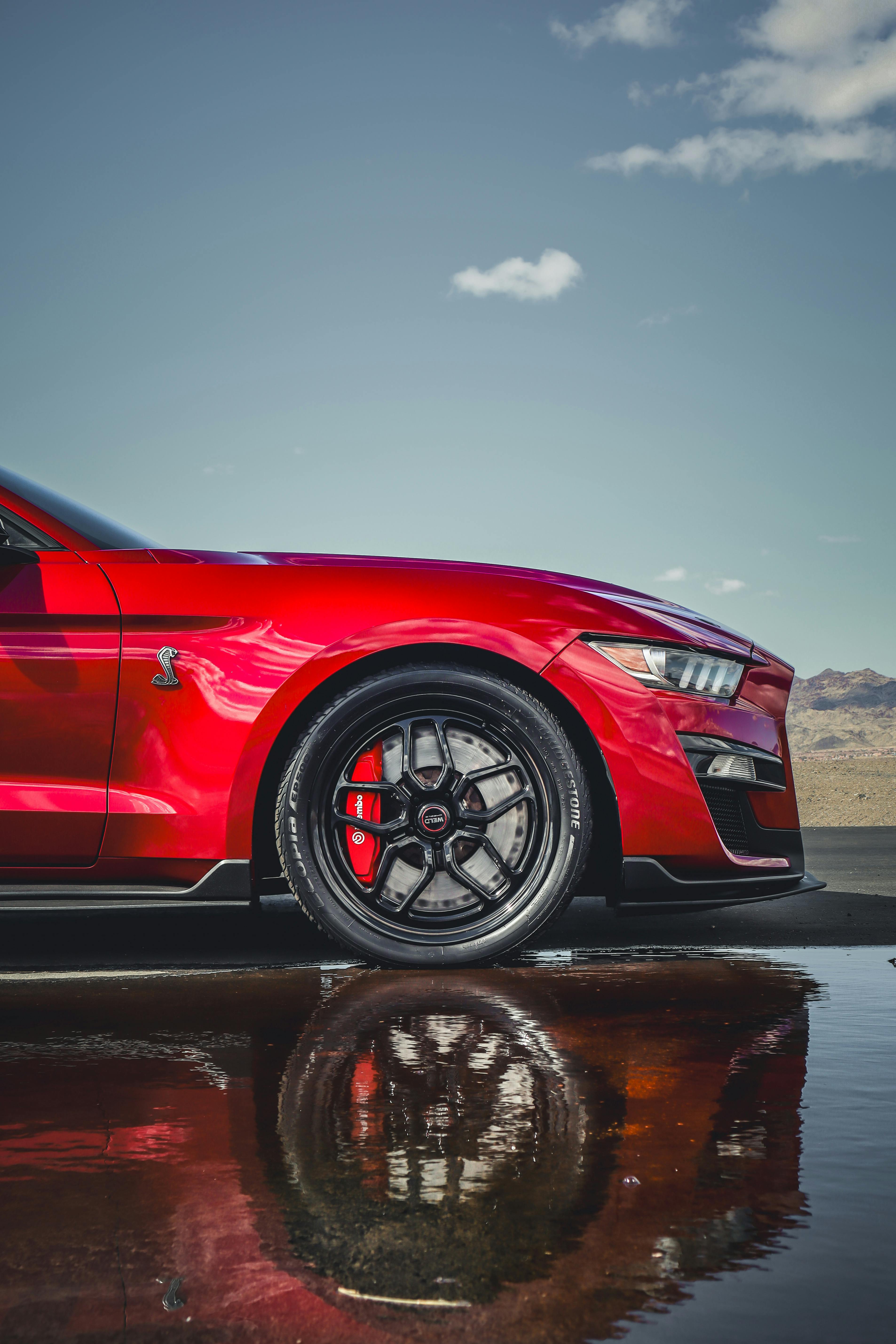Red Coupe Soft-top on Road · Free Stock Photo