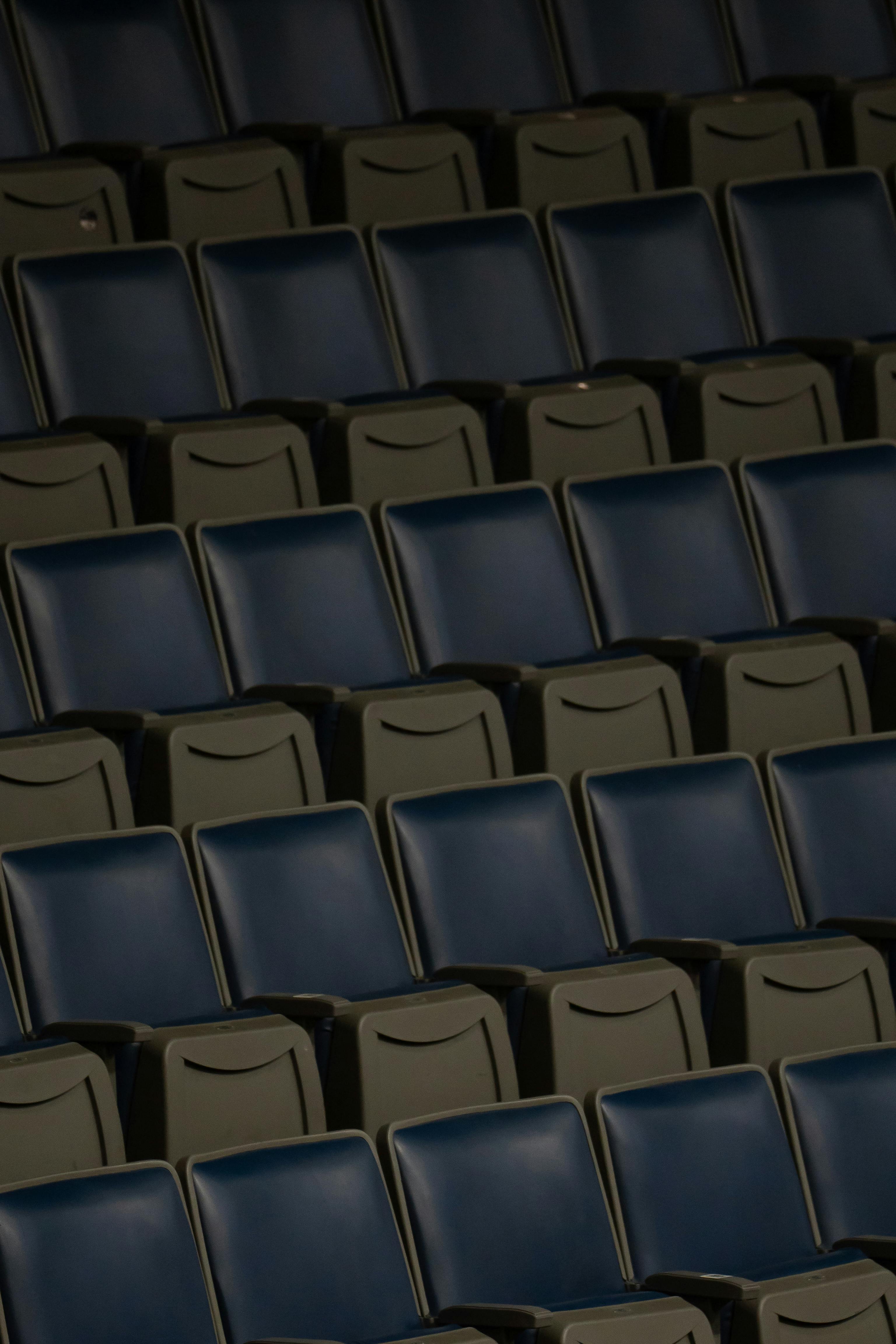 Modern Stadium Seating with Geometric Pattern · Free Stock Photo
