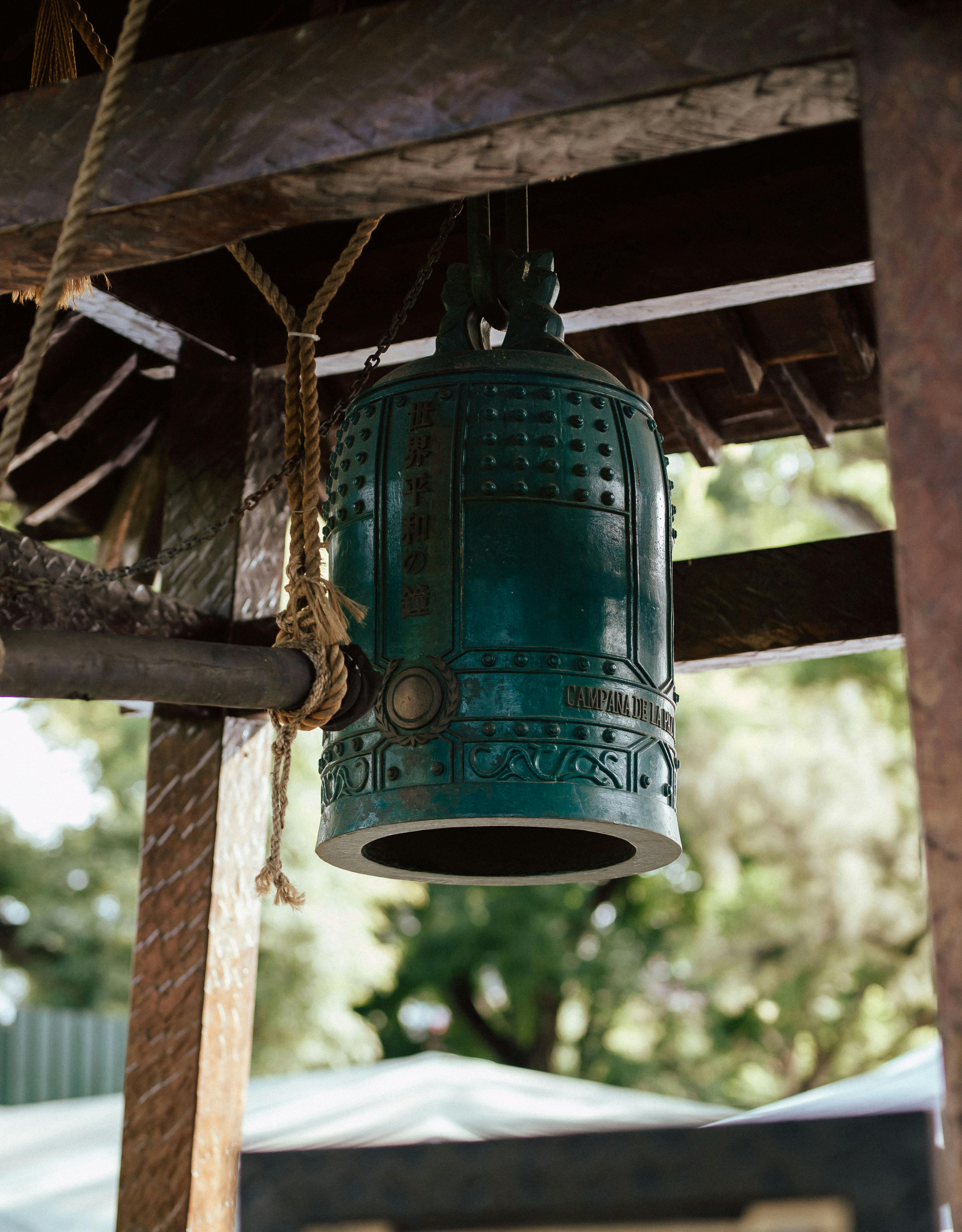 Ornate Bronze Bell in Buenos Aires Garden · Free Stock Photo