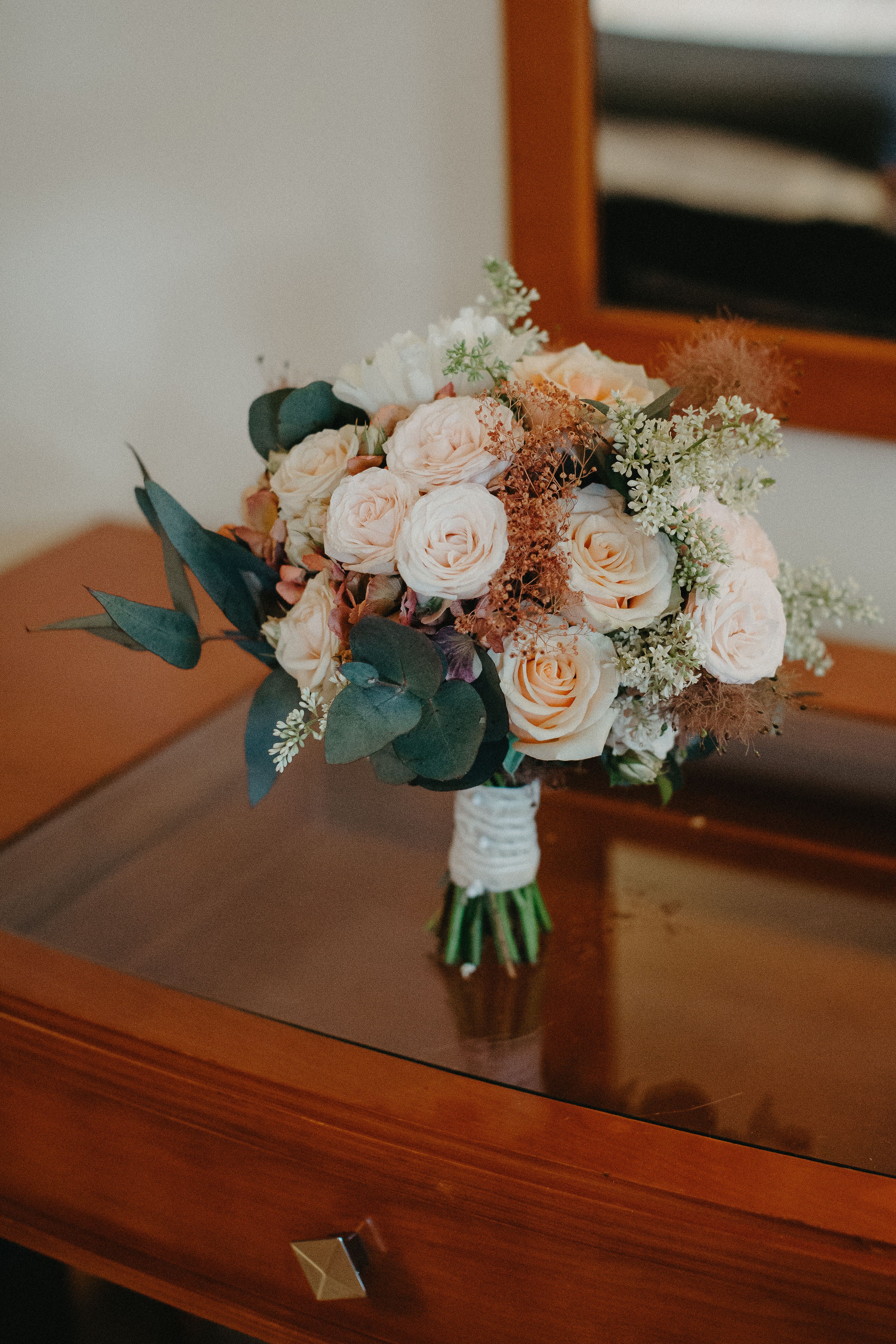 Elegant Rose Bouquet on Wooden Table · Free Stock Photo
