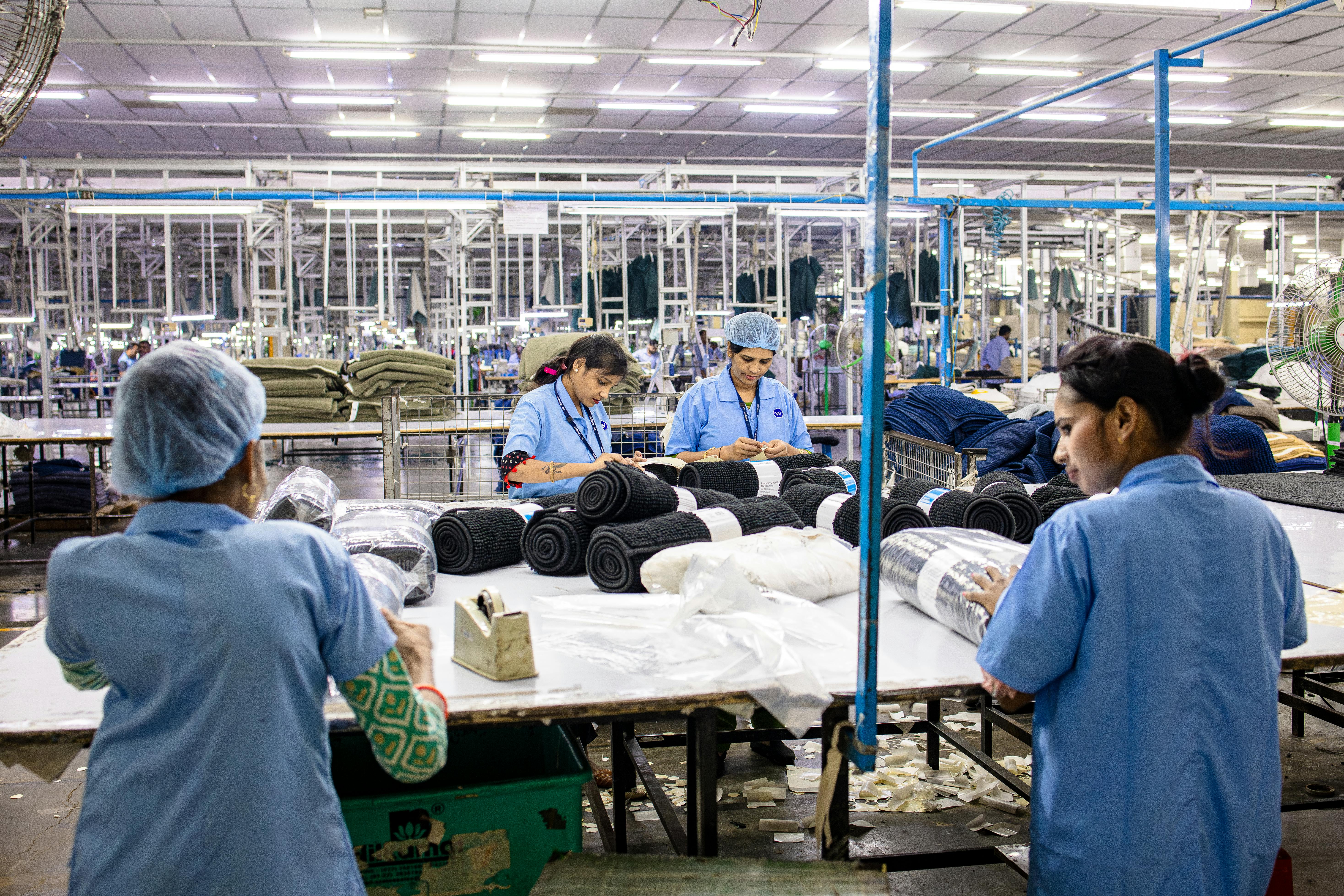 Workers in Textile Factory Sorting Materials · Free Stock Photo