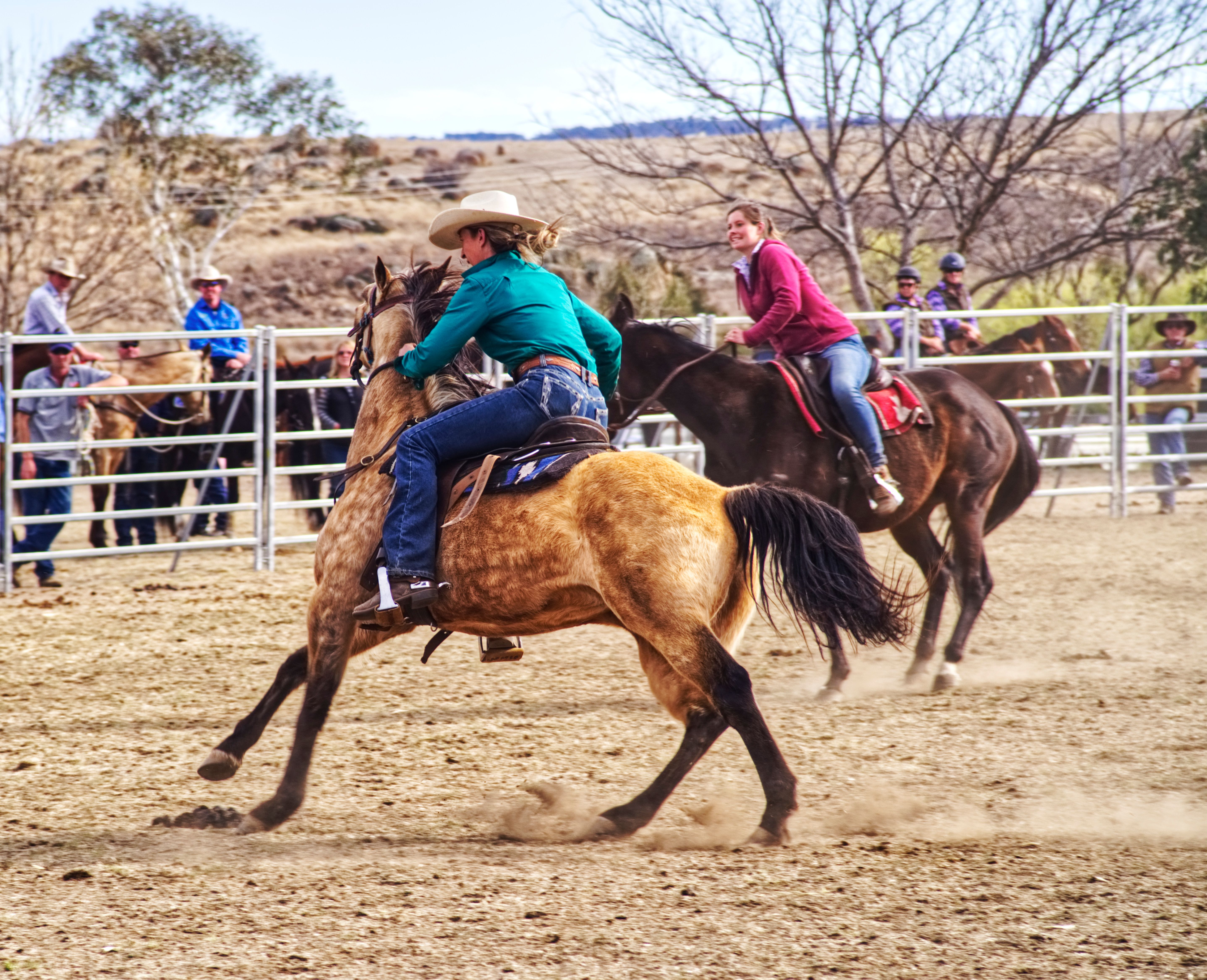 Exciting Horseback Riding Event in Ranch Arena · Free Stock Photo