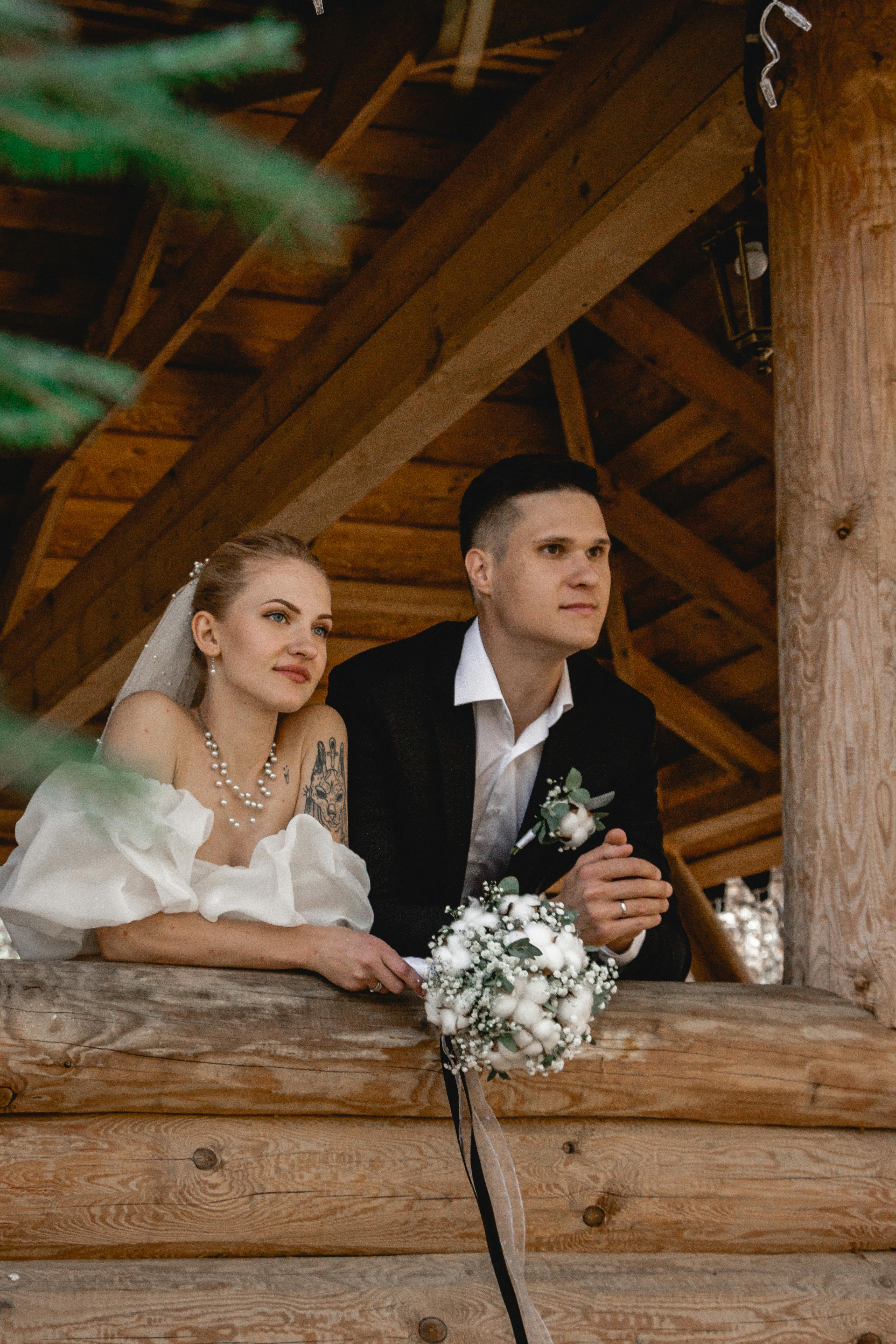 Rustic Wedding Couple on Wooden Balcony · Free Stock Photo