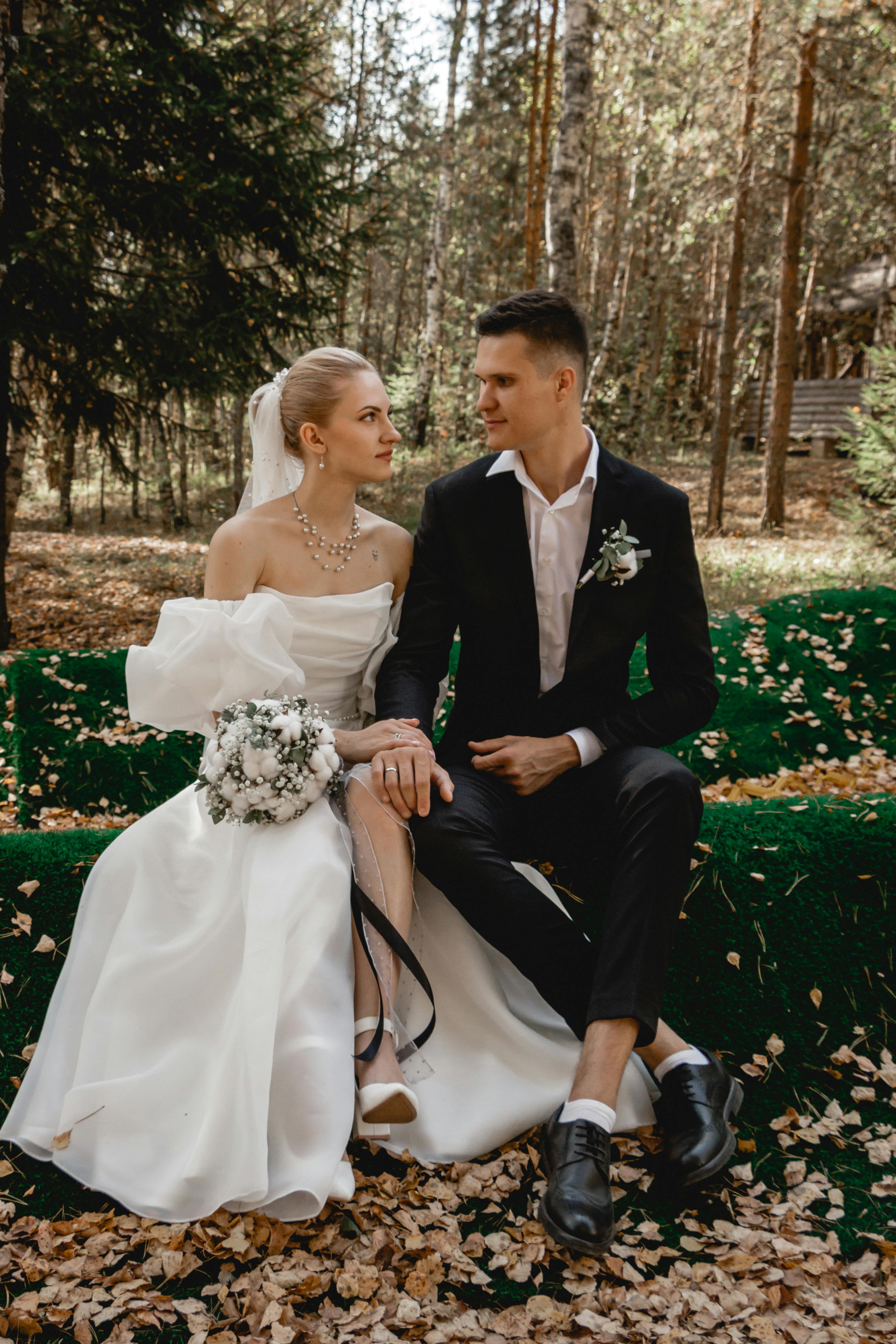 Elegant Outdoor Wedding Portrait in Forest Setting · Free Stock Photo