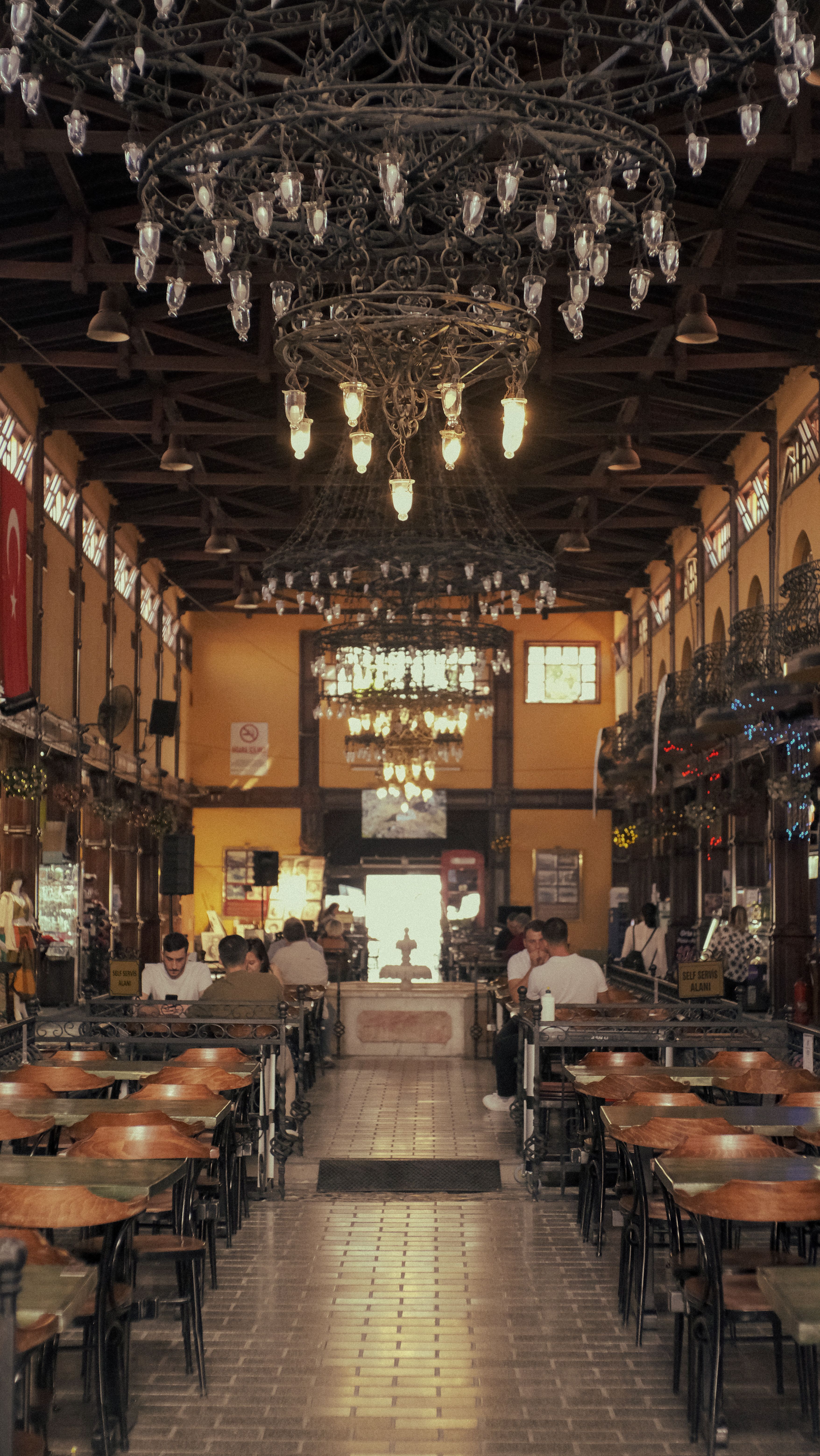 Elegant Vintage Cafe Interior with Chandelier Lighting · Free Stock Photo