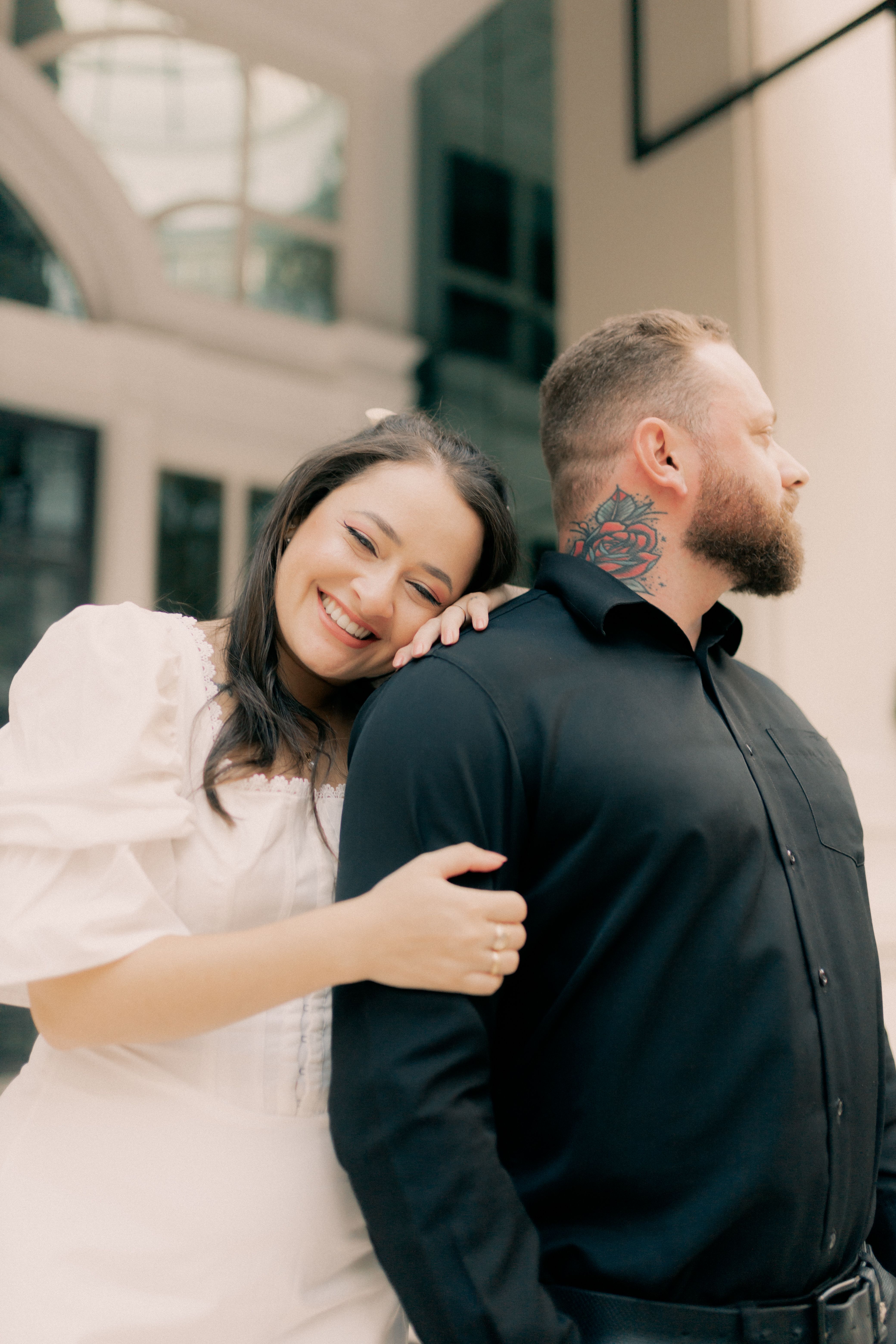 Happy Couple Embracing in Urban Setting · Free Stock Photo