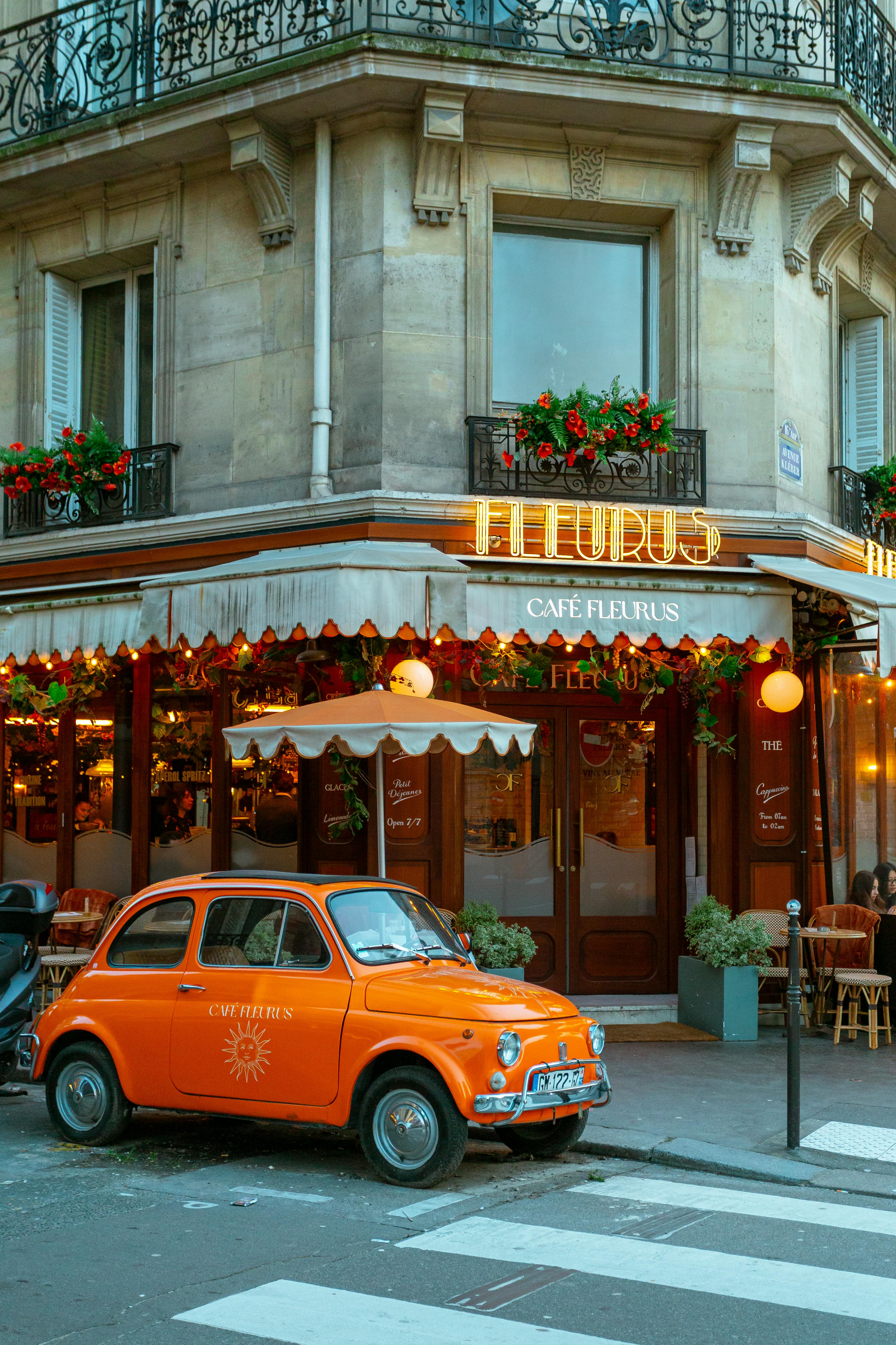 Charming Paris Café Scene with Orange Fiat · Free Stock Photo