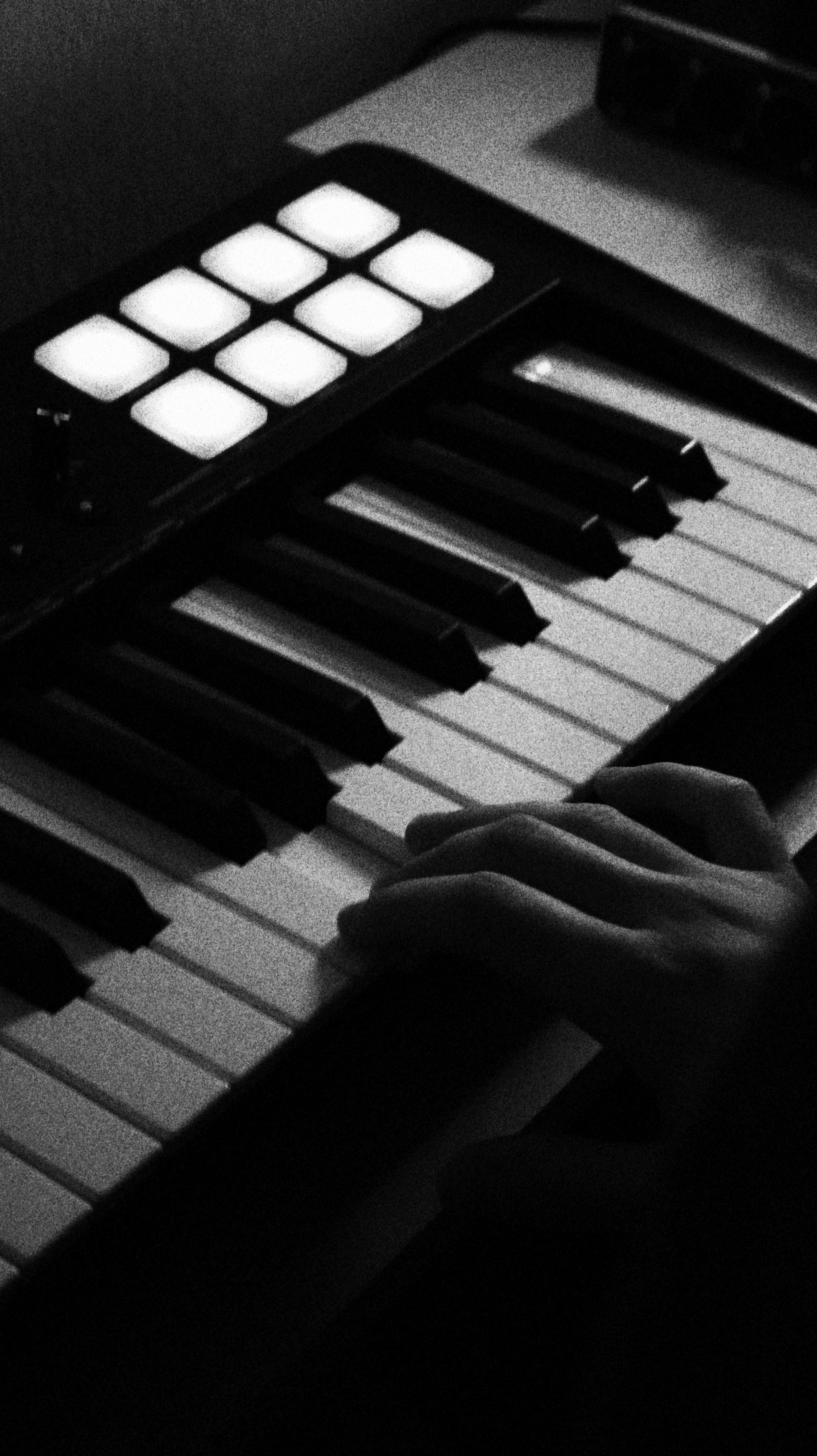 Close-up of a Hand Playing Keyboard Piano · Free Stock Photo