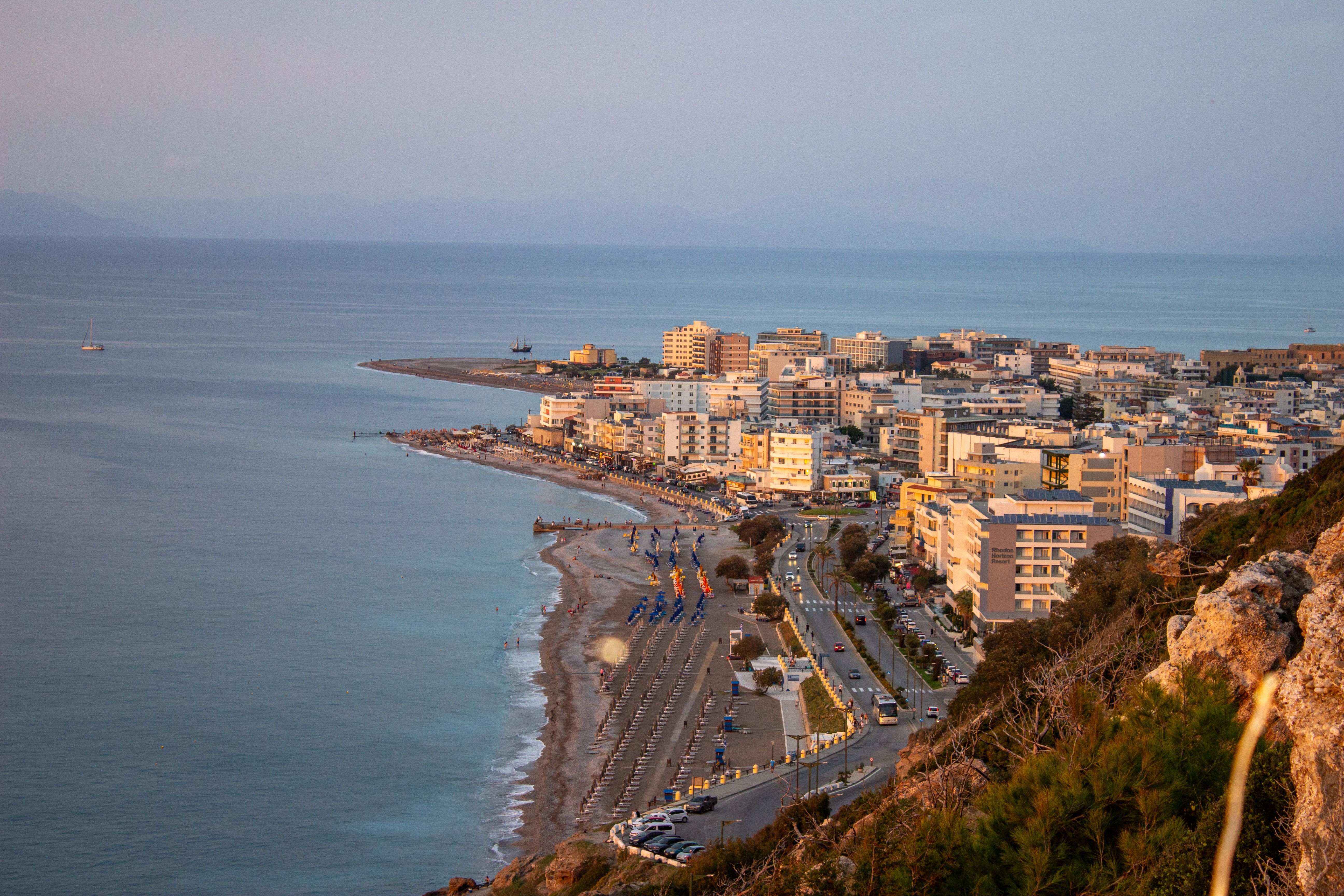 Aerial View of Coastal City at Sunset · Free Stock Photo