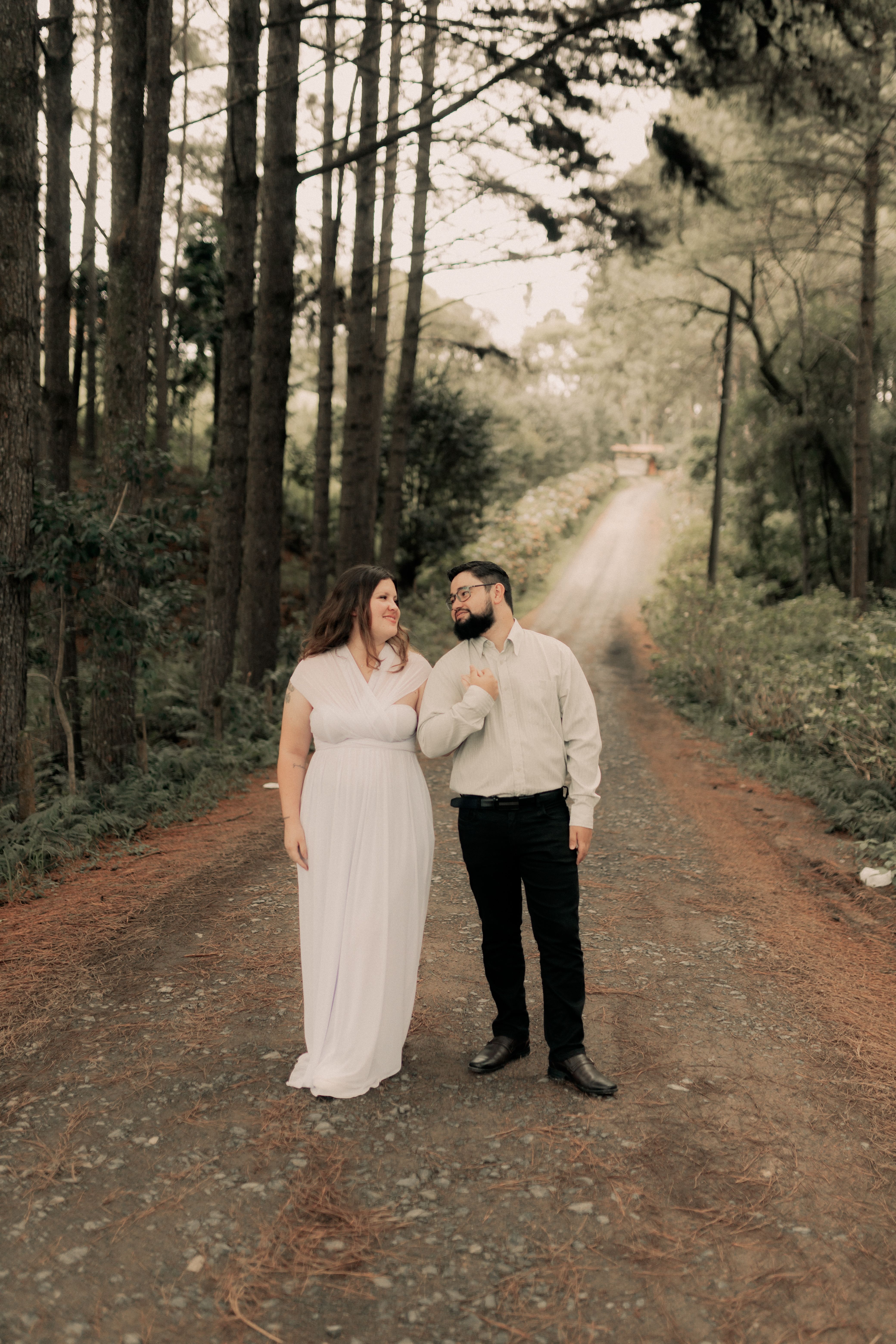 Romantic Couple Walking in Forest Path · Free Stock Photo