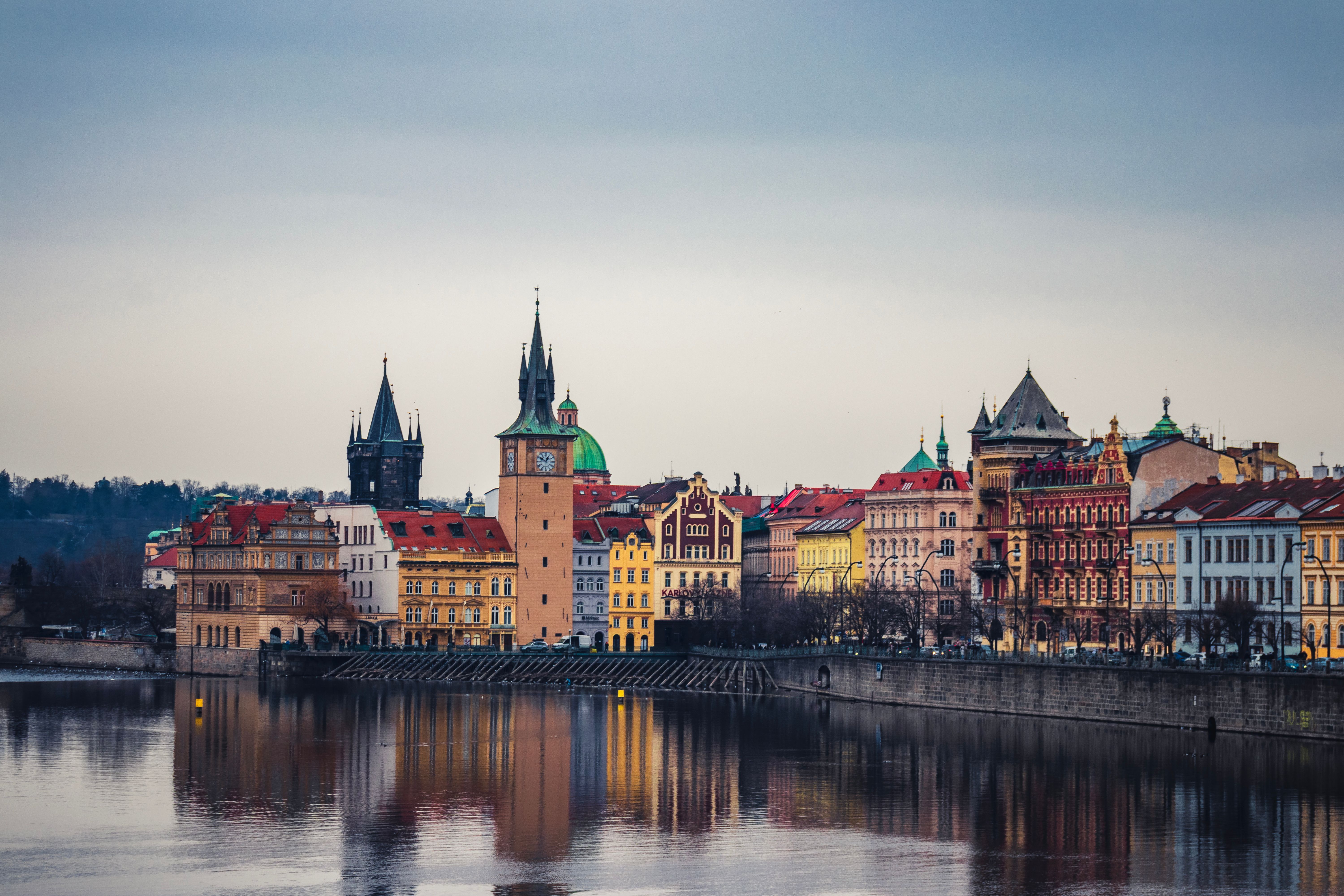 Scenic View of Prague's Historic Riverfront · Free Stock Photo