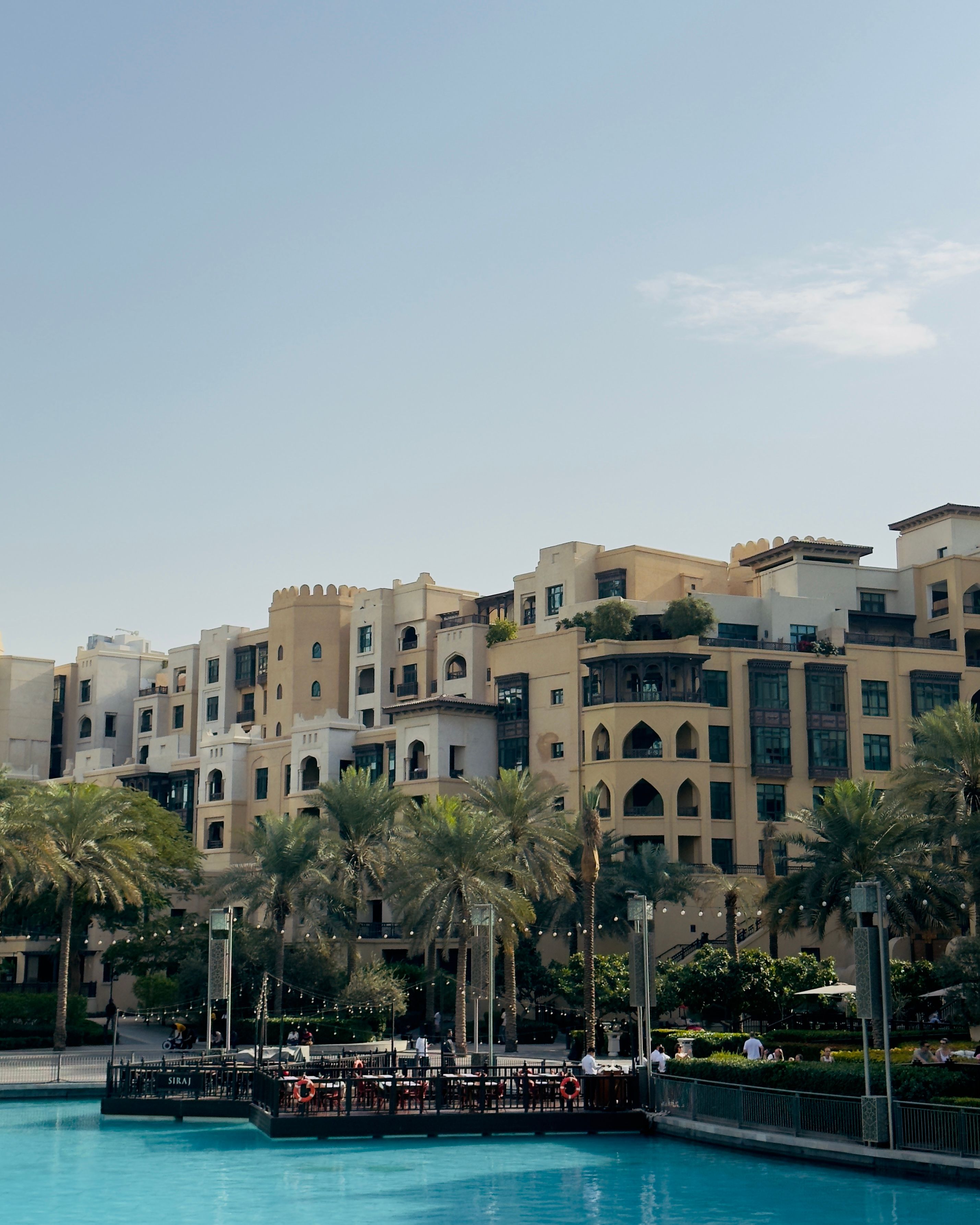 Scenic View of Modern Middle Eastern Architecture and Palm Trees · Free ...