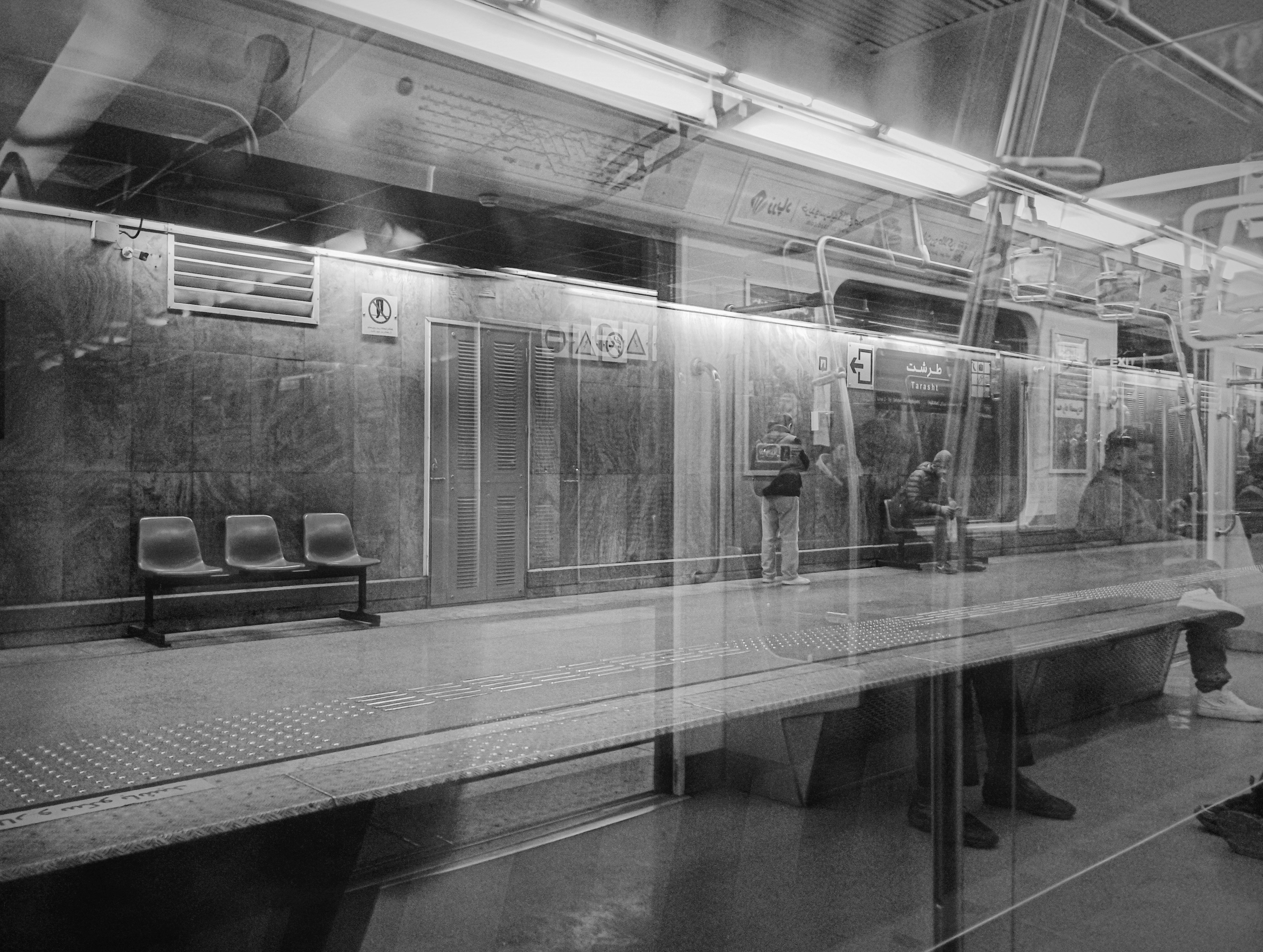 Monochrome Reflection in Tehran's Metro Station · Free Stock Photo